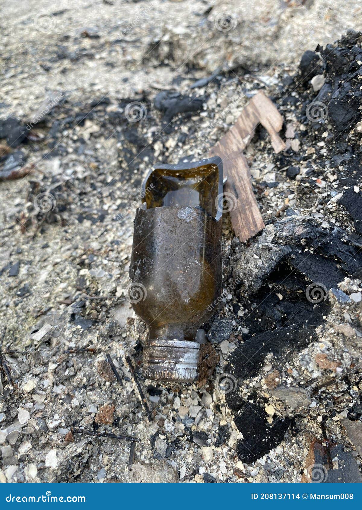Ash and Bottle on the Ground Stock Photo - Image of outdoor, pollution ...