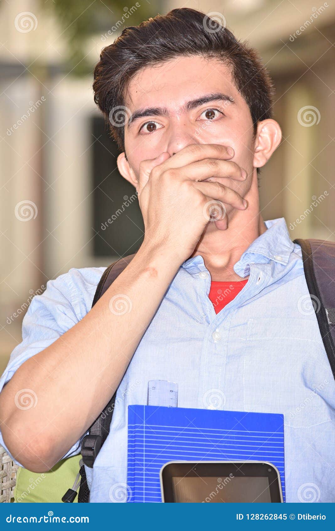 Ashamed Male Student stock image. Image of masculine - 128262845