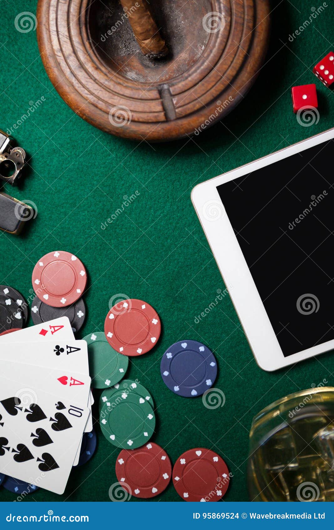 Ashtray, Digital Tablet, Dice, Casino Chips and Playing Cards on Poker ...