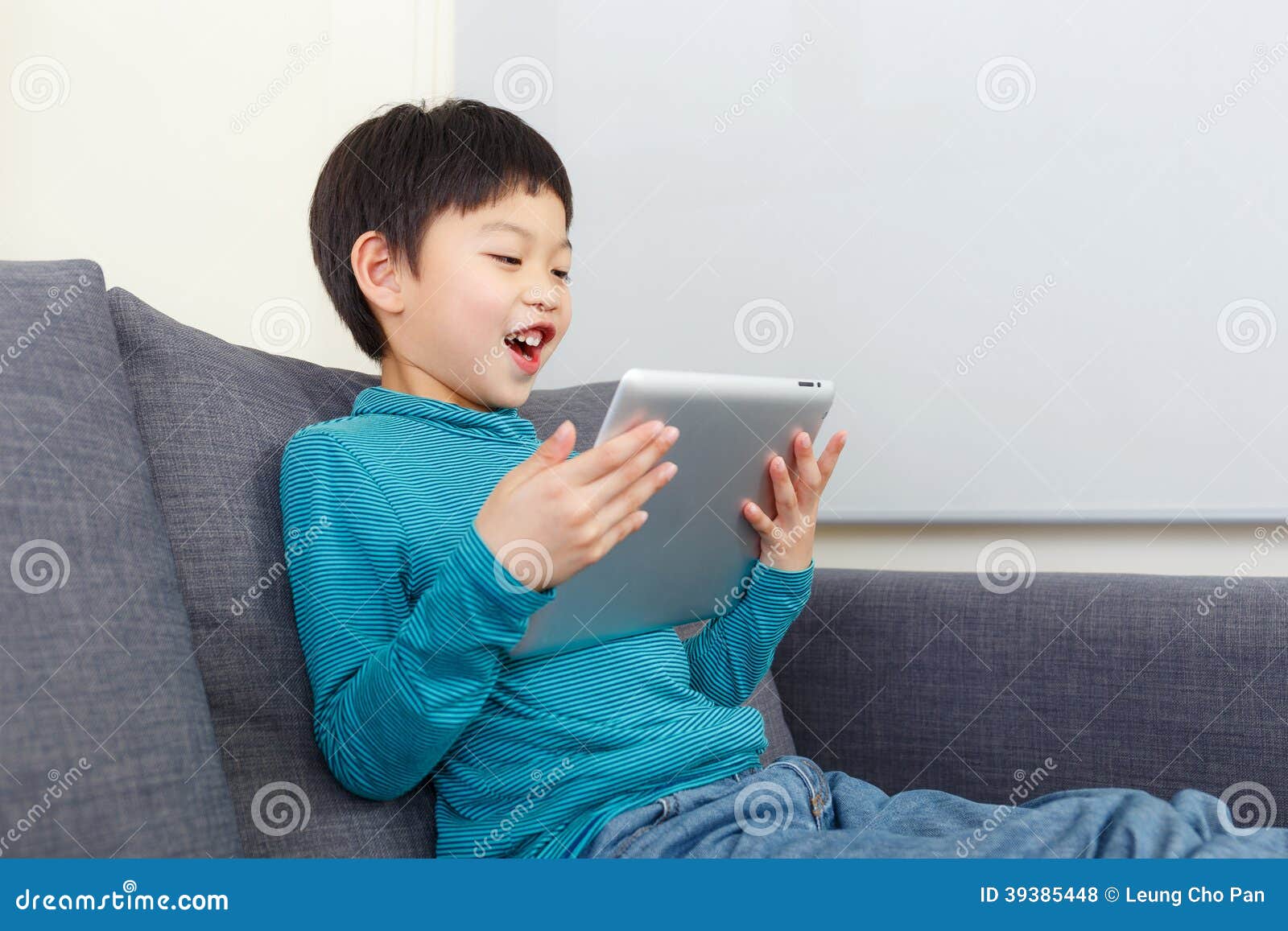 Asia Little Boy Playing Game on Tablet Stock Photo - Image of child ...