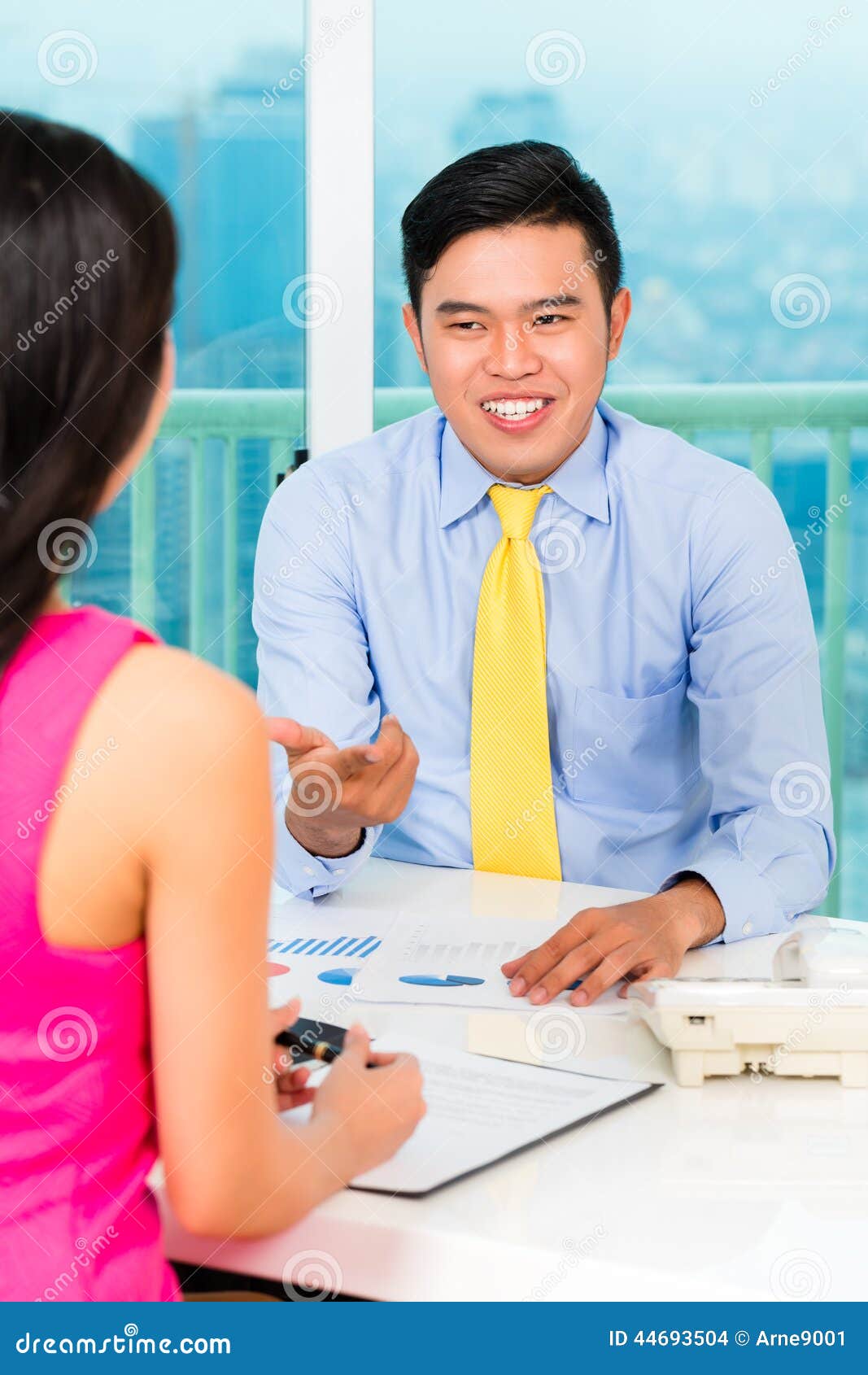 Asian advisor with client stock photo. Image of investment - 44693504