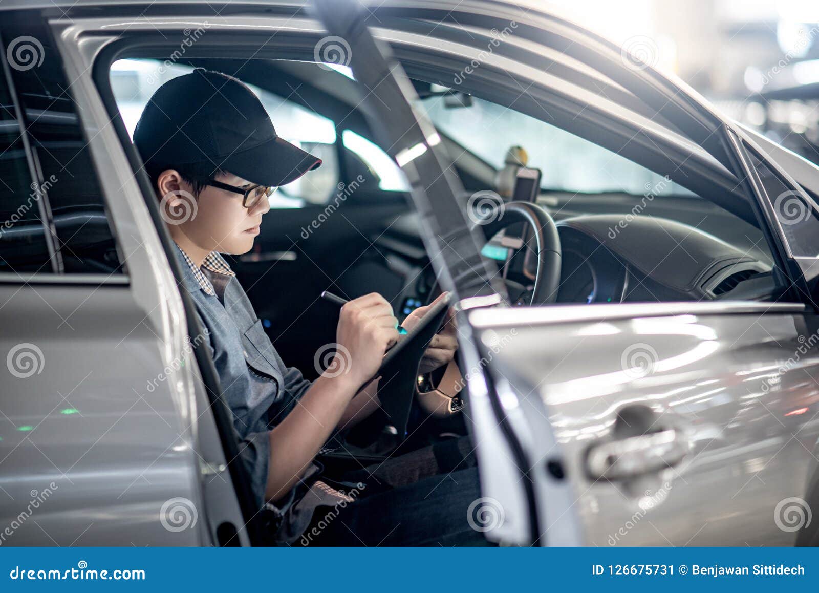 Asian Auto Mechanic Checking the Car Using Tablet Stock Image - Image ...