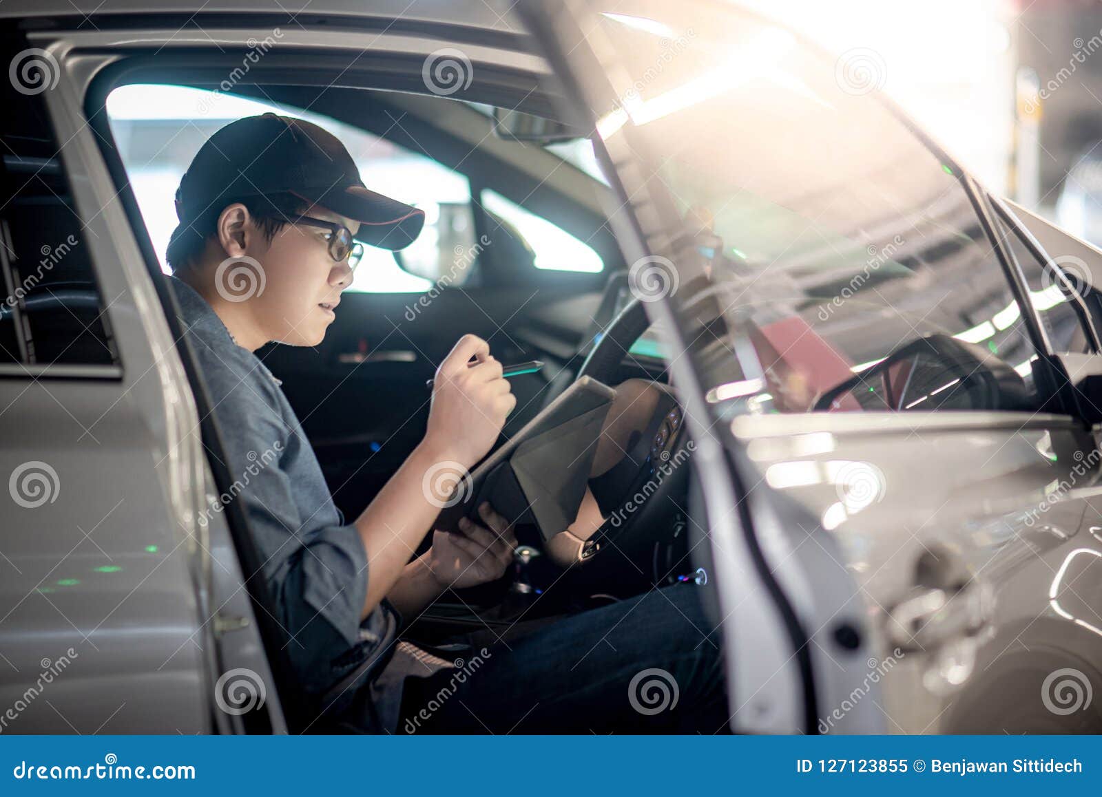 Asian Auto Mechanic Checking the Car Using Tablet Stock Image - Image ...
