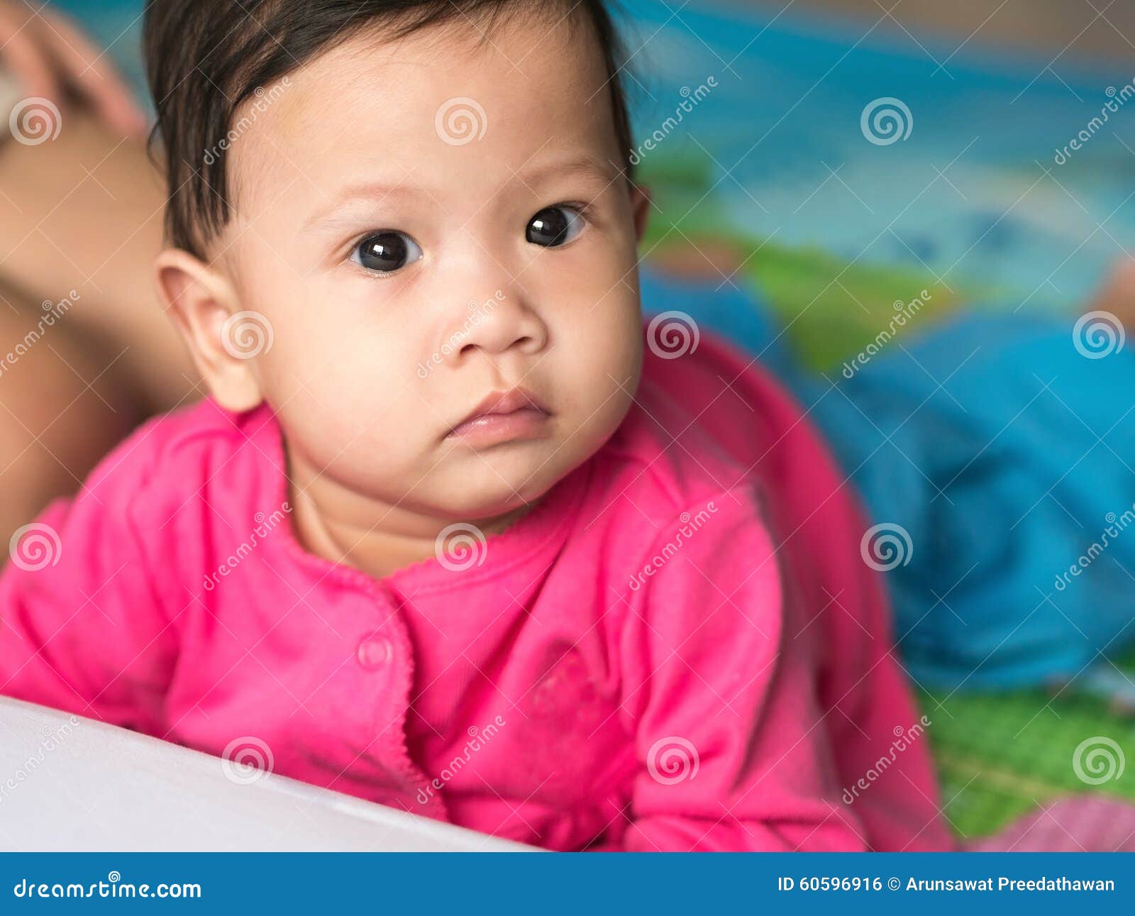 Asian Baby Crawling on the Floor and Looking Straight. Stock Photo ...