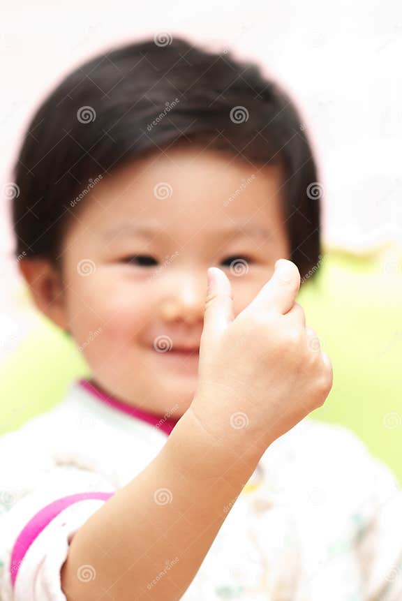 Asian baby gesture stock image. Image of laugh, finger - 13073845