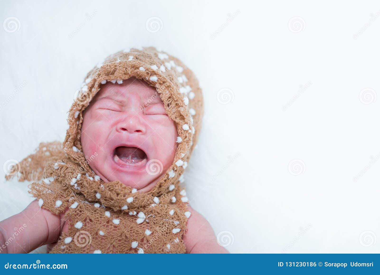 Newborn On The Bed. Crying, Screaming Baby Close Up And Copy Space ...