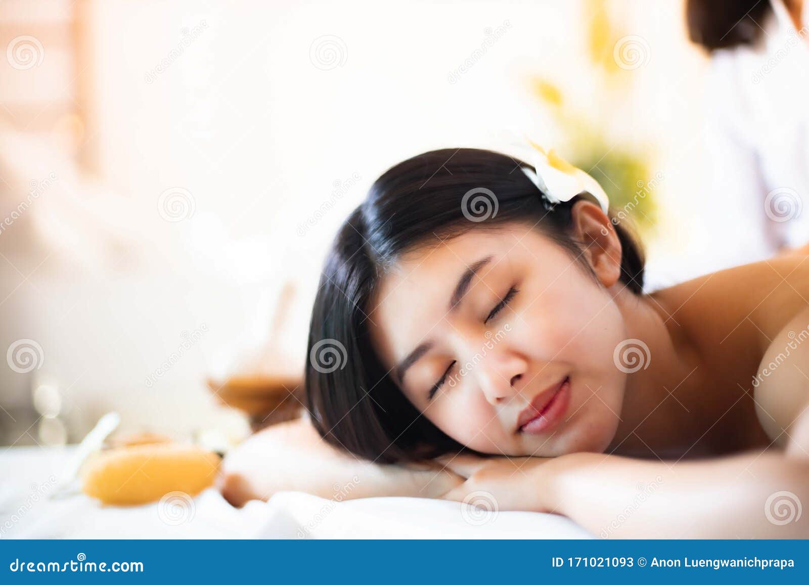 Asian Beautiful Young And Healthy Woman In Spa Salon Massage