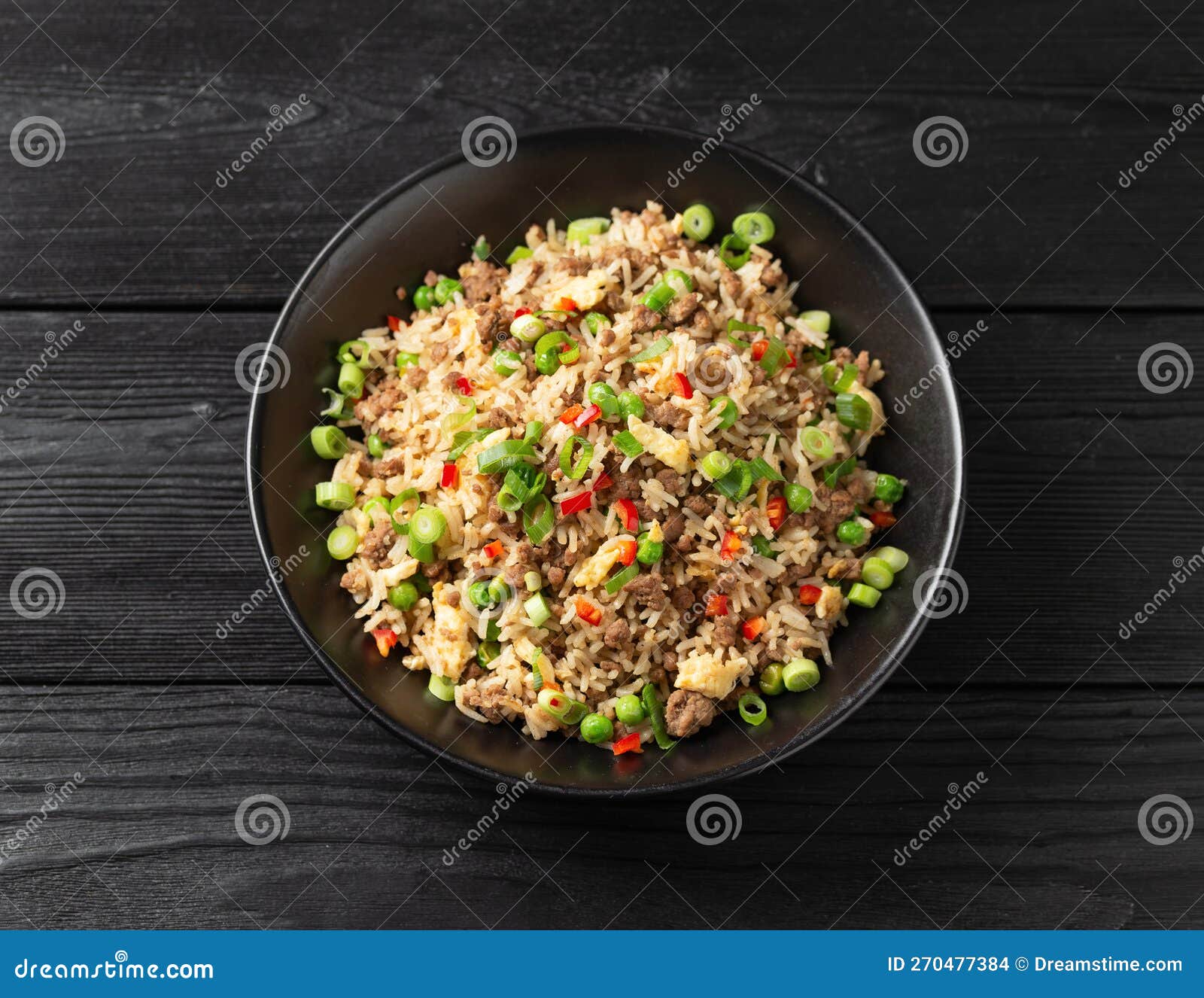 Asian Beef Fried Rice with Eggs and Vegetables in Black Bowl Stock ...