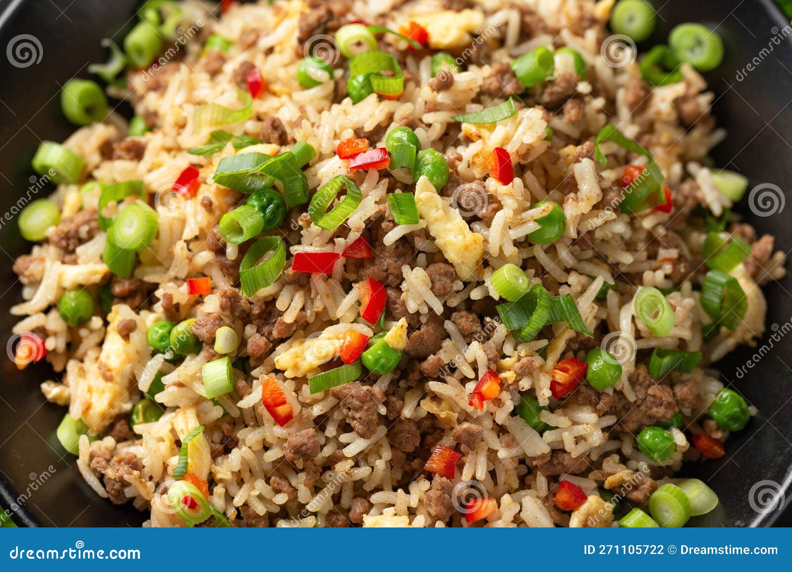 Asian Beef Fried Rice with Eggs and Vegetables in Black Bowl Stock ...