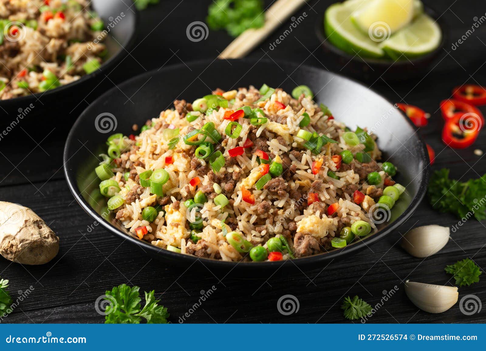 Asian Beef Fried Rice with Eggs and Vegetables in Black Bowl Stock ...