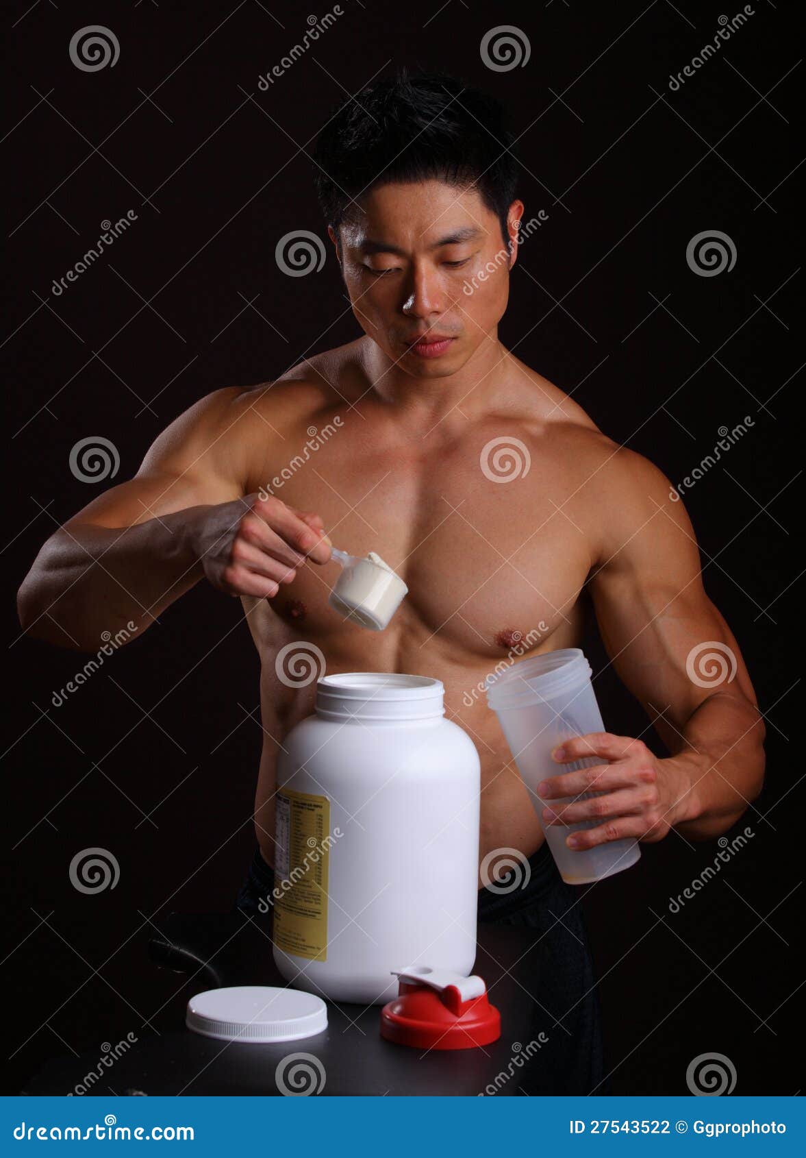 Asian Body Builder Pouring a Scoop of Protein Mix Stock Photo - Image ...