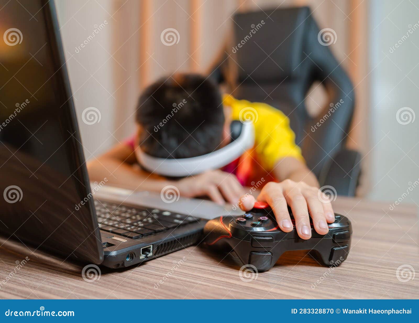 Asian Boy Dizzy while Playing Game on Computer with Game Controller ...