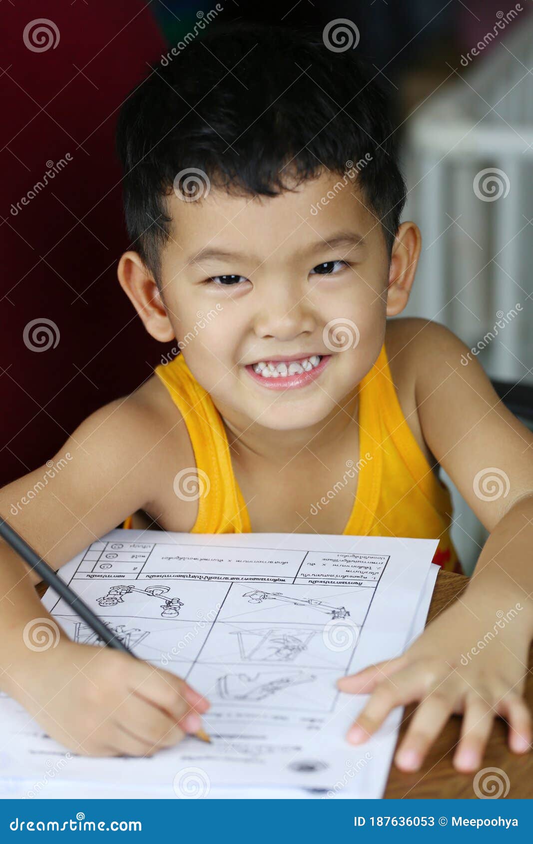 Asian Boy is Doing His Homework,concept of Studying on-live at Home ...