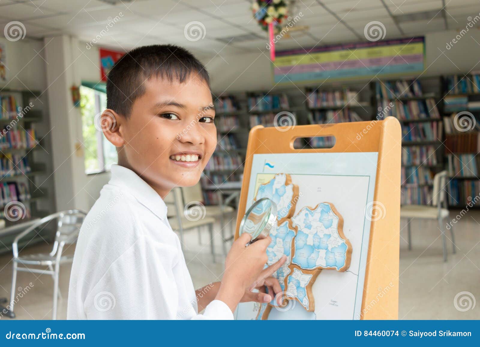 Asian boy doing homework . stock photo. Image of asia - 84460074