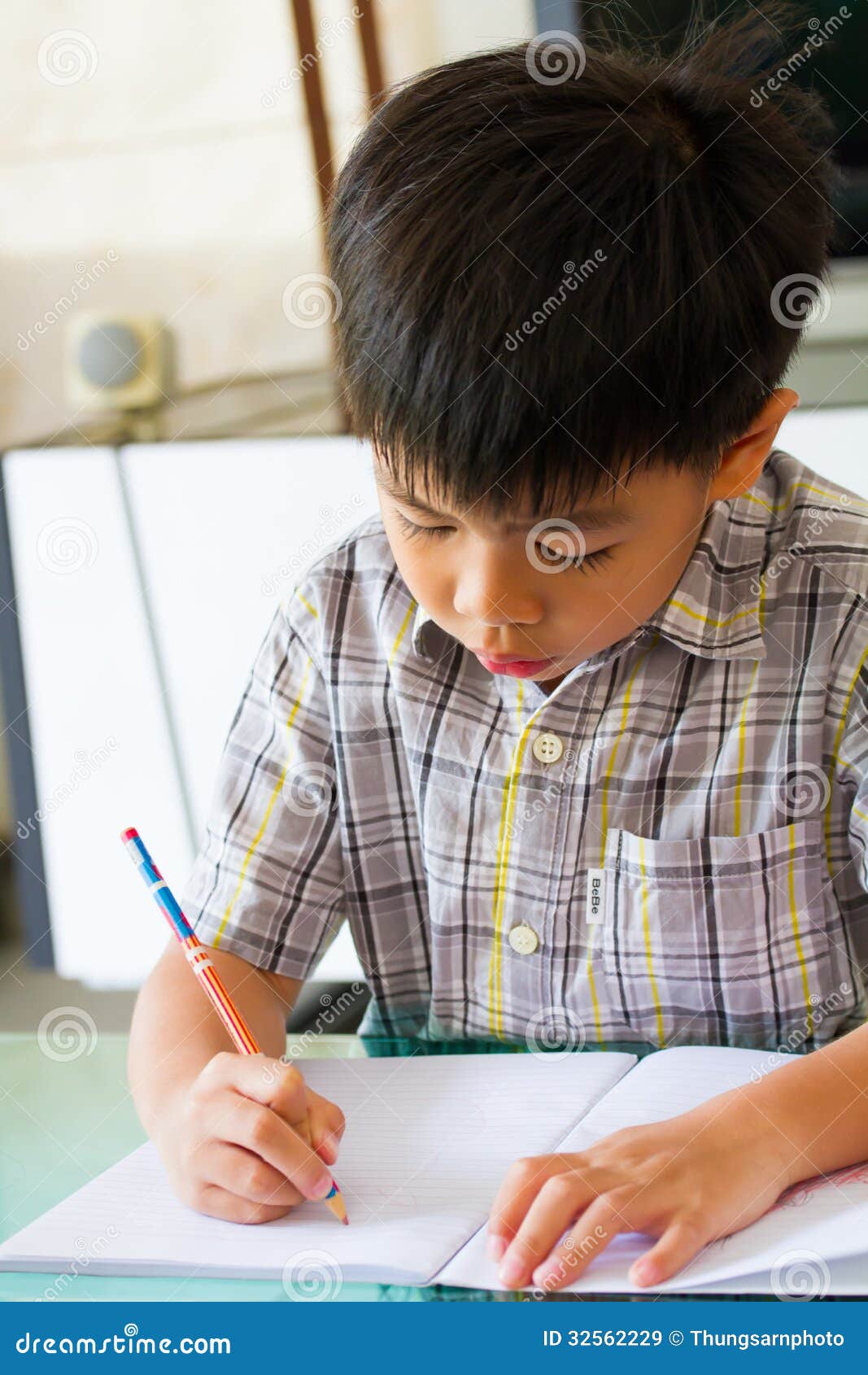 Asian boy doing homework stock image. Image of thai, childhood - 32562229