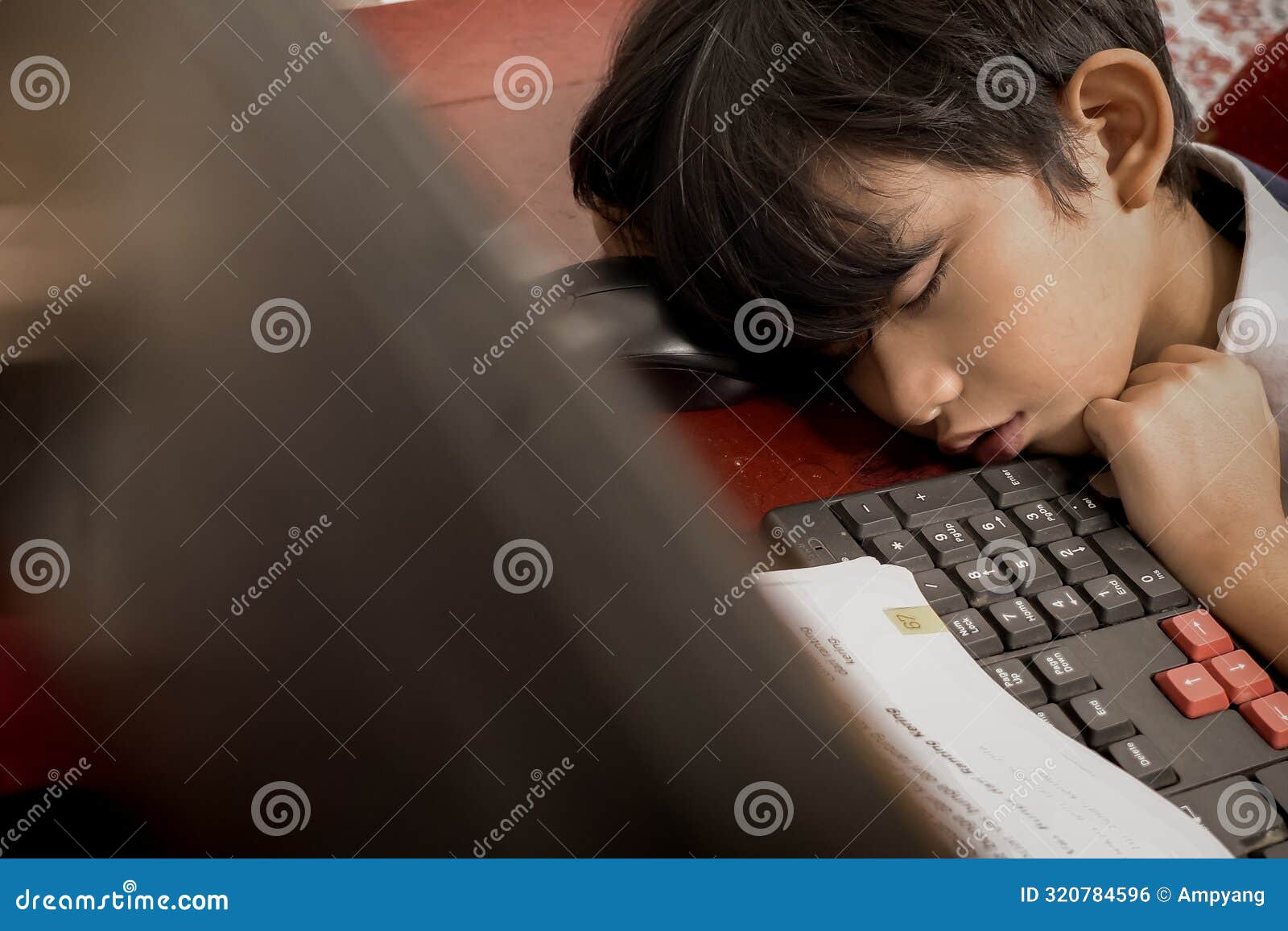 Asian Boy Fallen Asleep in Front of His Computer Stock Photo - Image of ...