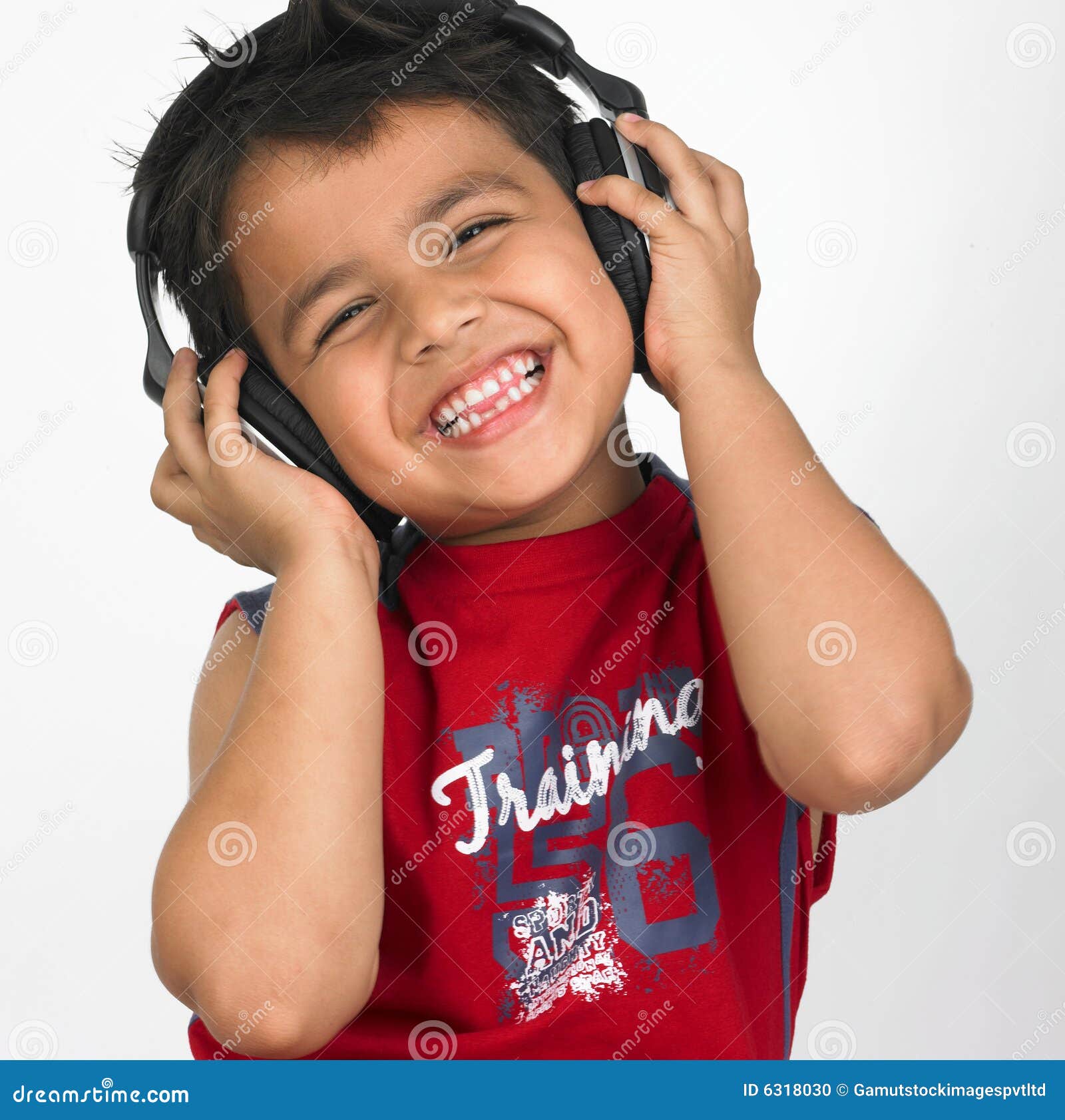 Asian boy with headphones stock photo. Image of laughing - 6318030