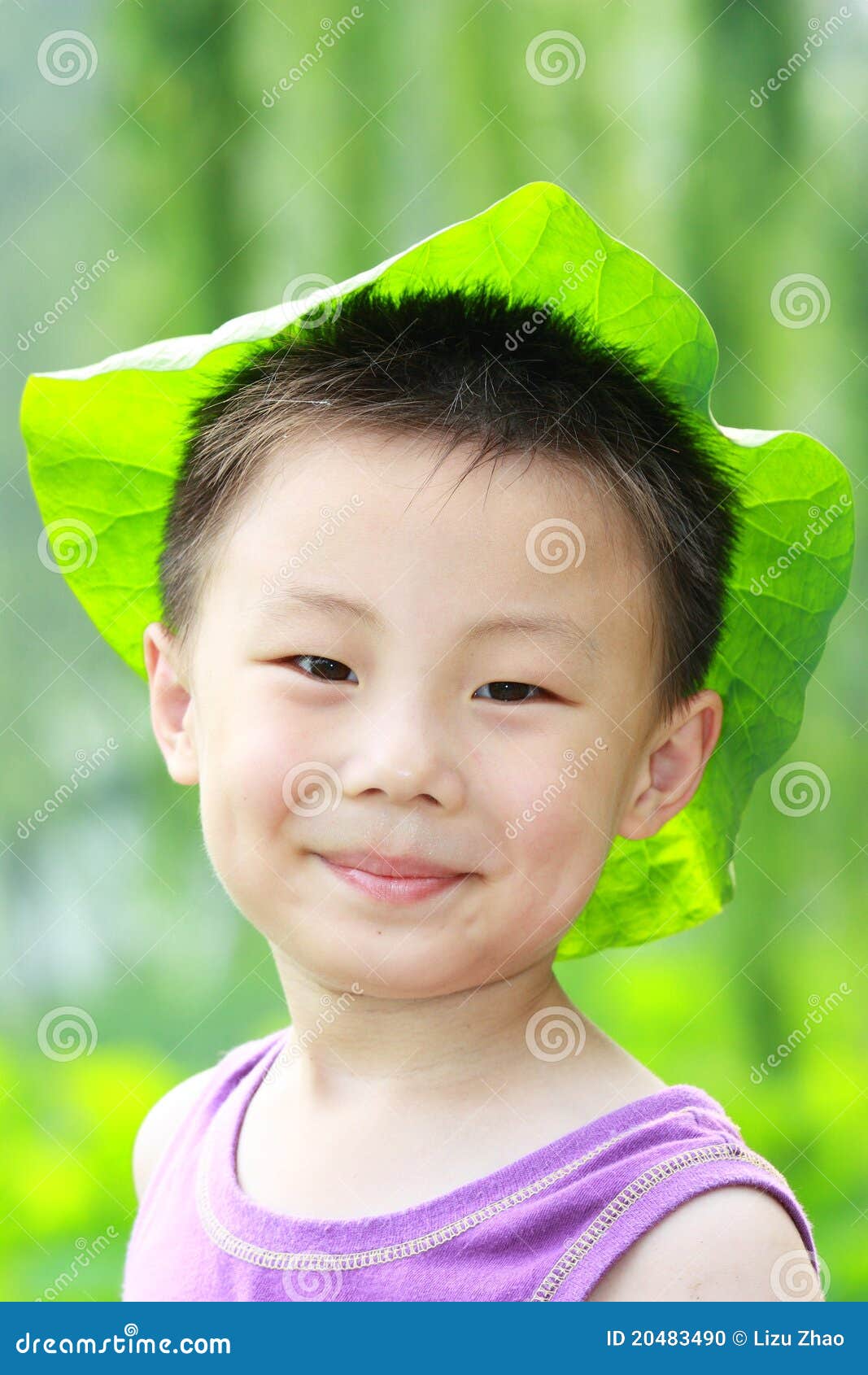 Asian boy with leaf cap stock photo. Image of glad, autumn - 20483490