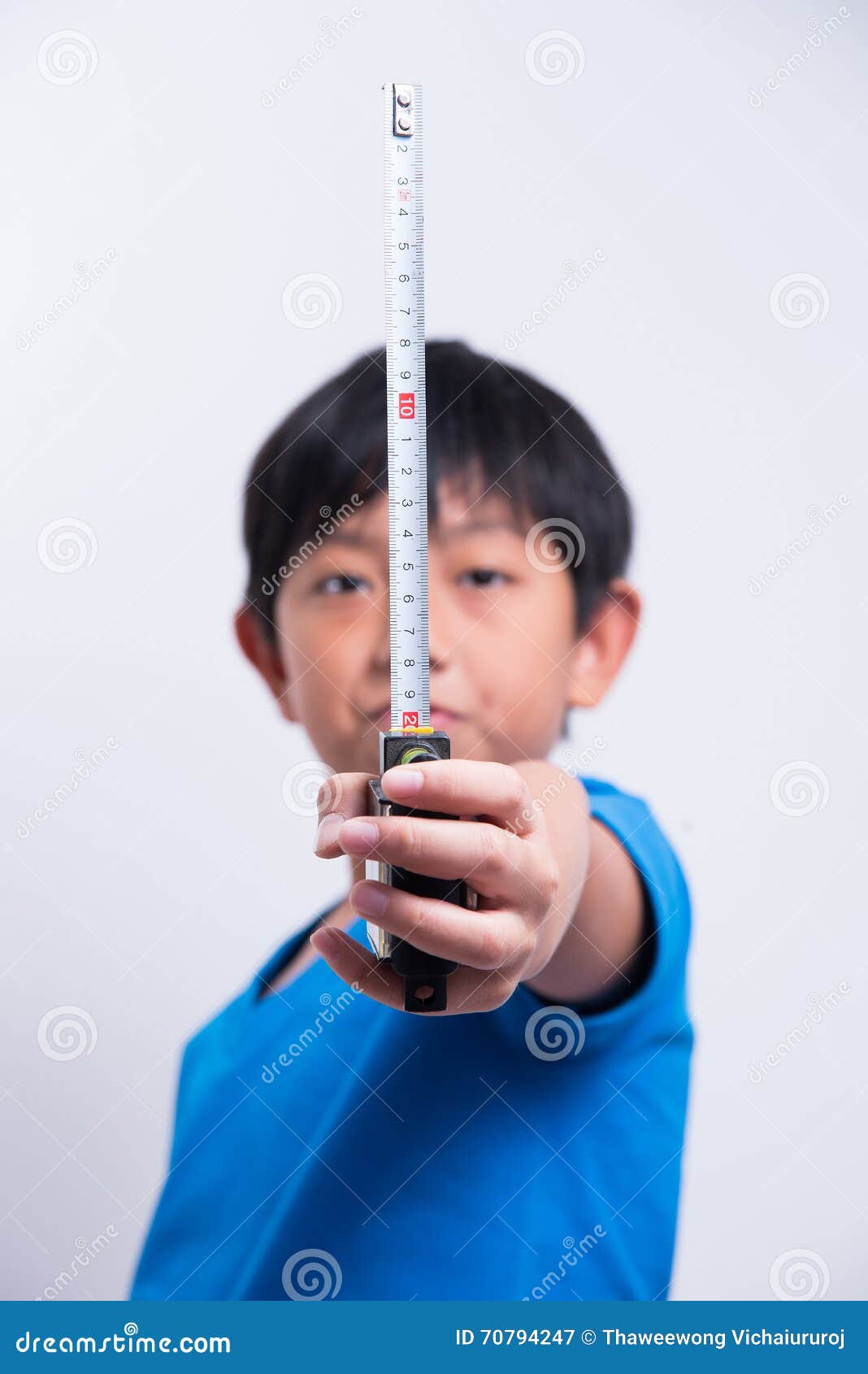 Asian boy measure stock image. Image of childhood, child - 70794247