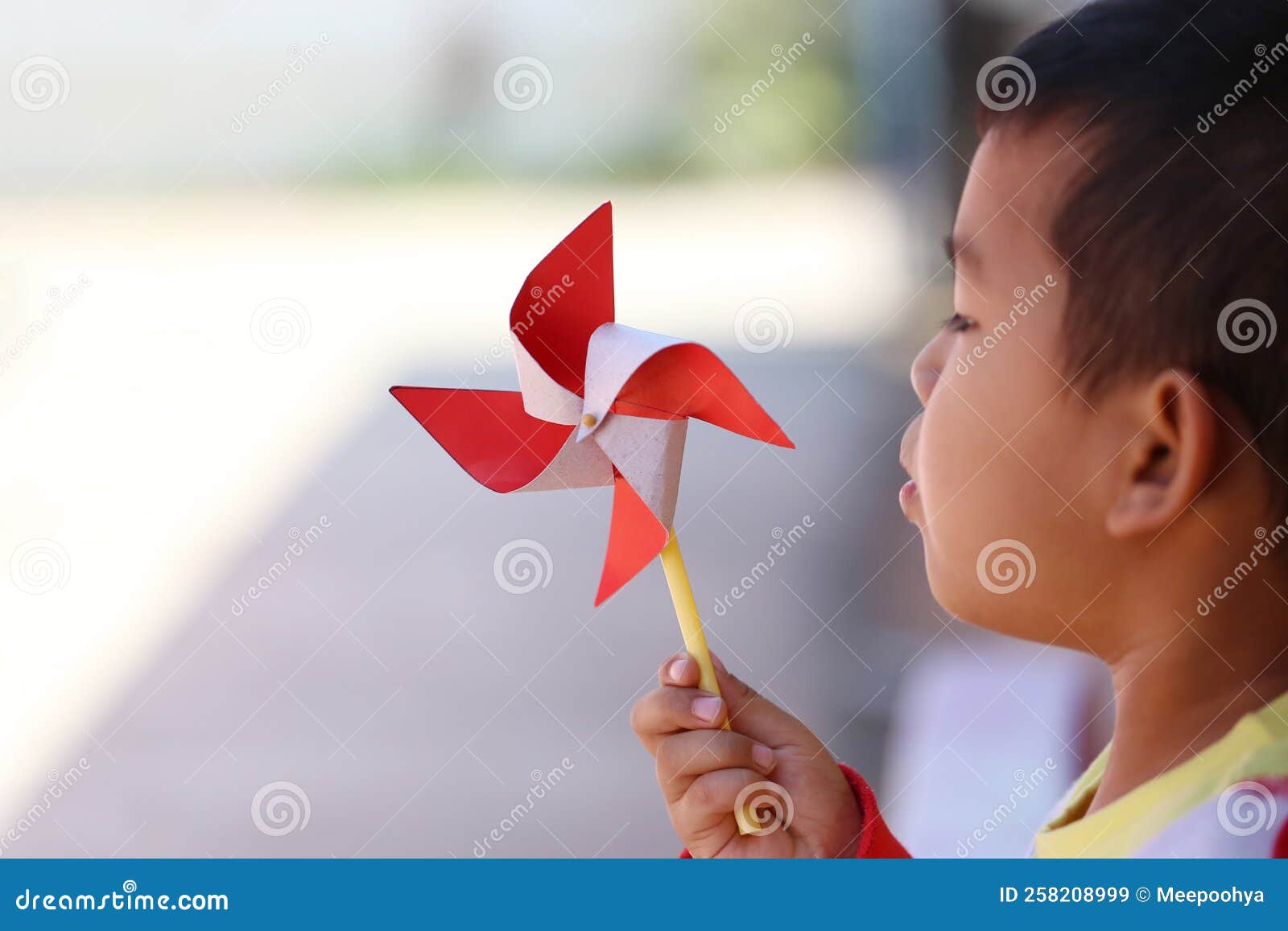 Asian Boy Playing with Red Windmill Stock Image - Image of carrying ...