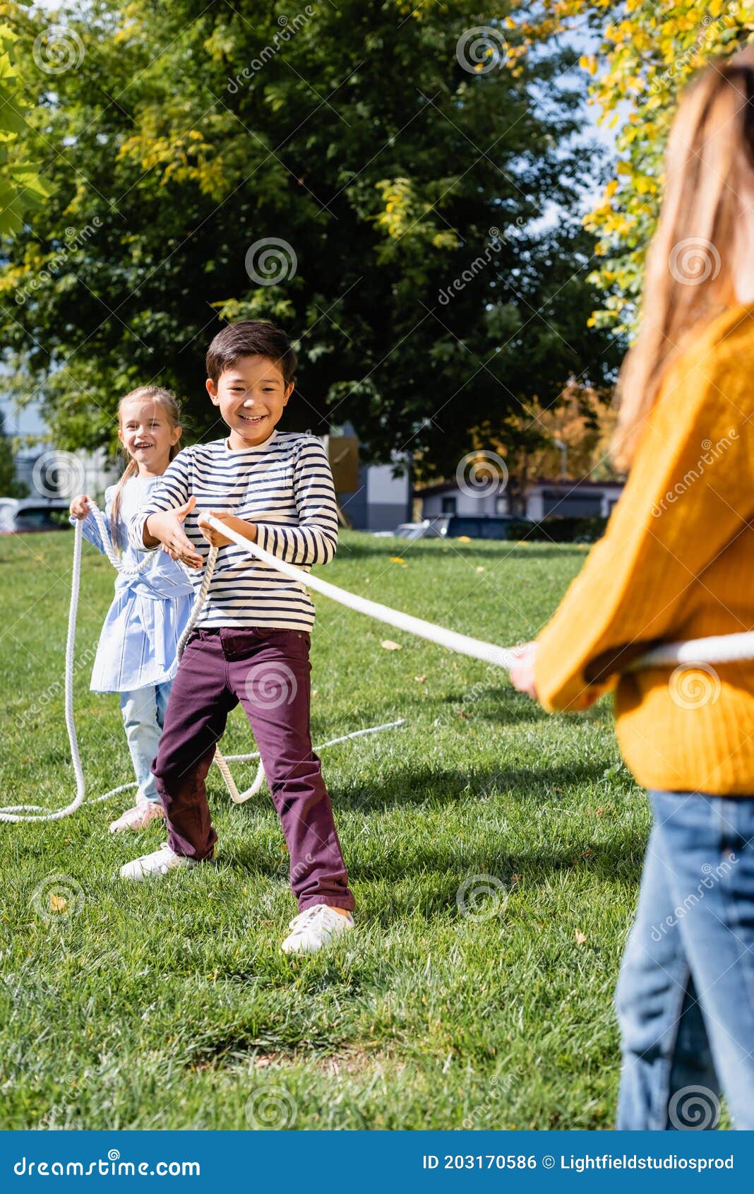 Asian Boy Pulling Rope while Playing Stock Photo - Image of play ...