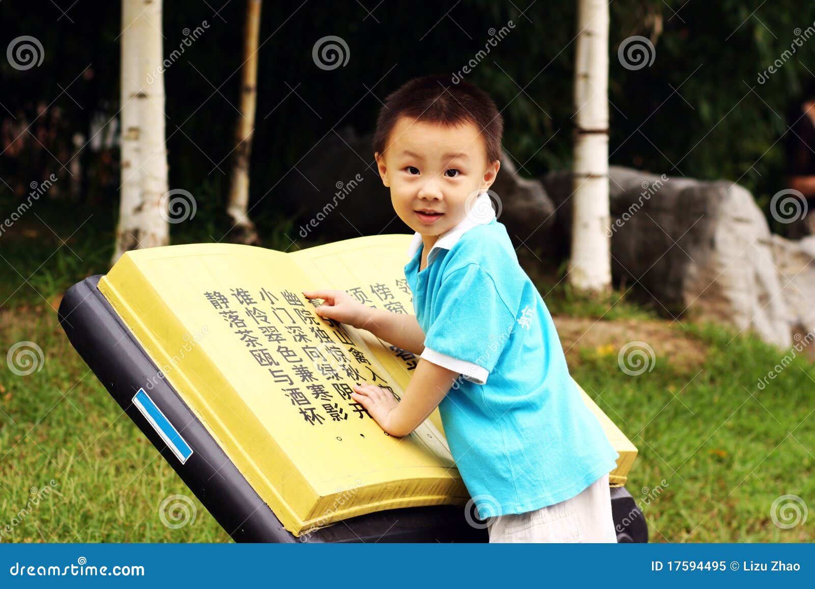 Asian boy is reading stock image. Image of child, asia - 17594495