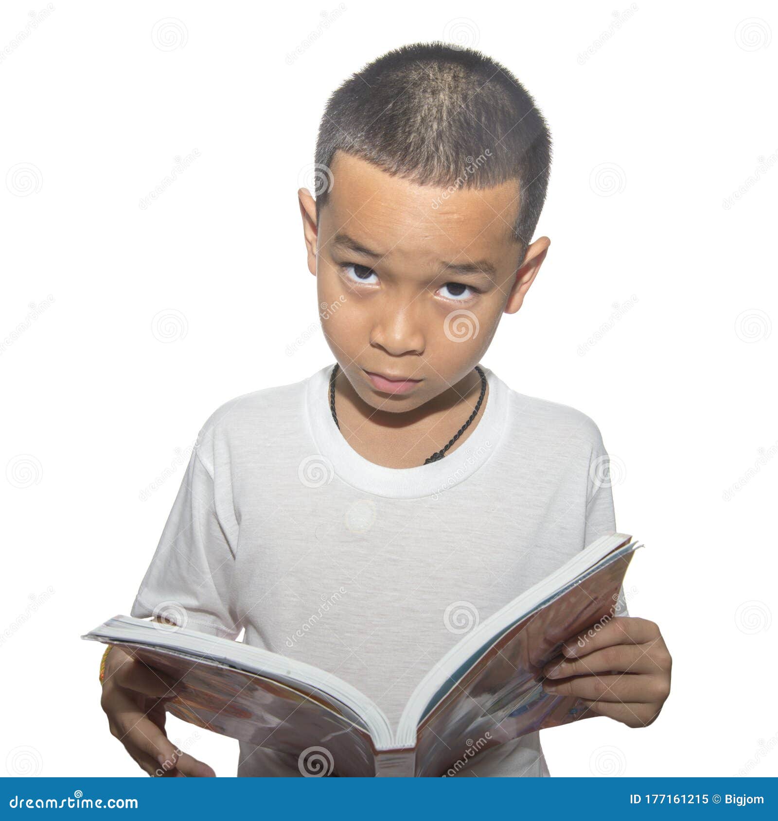 Boy Reading a Book Look at the Camera Stock Image - Image of knowledge ...