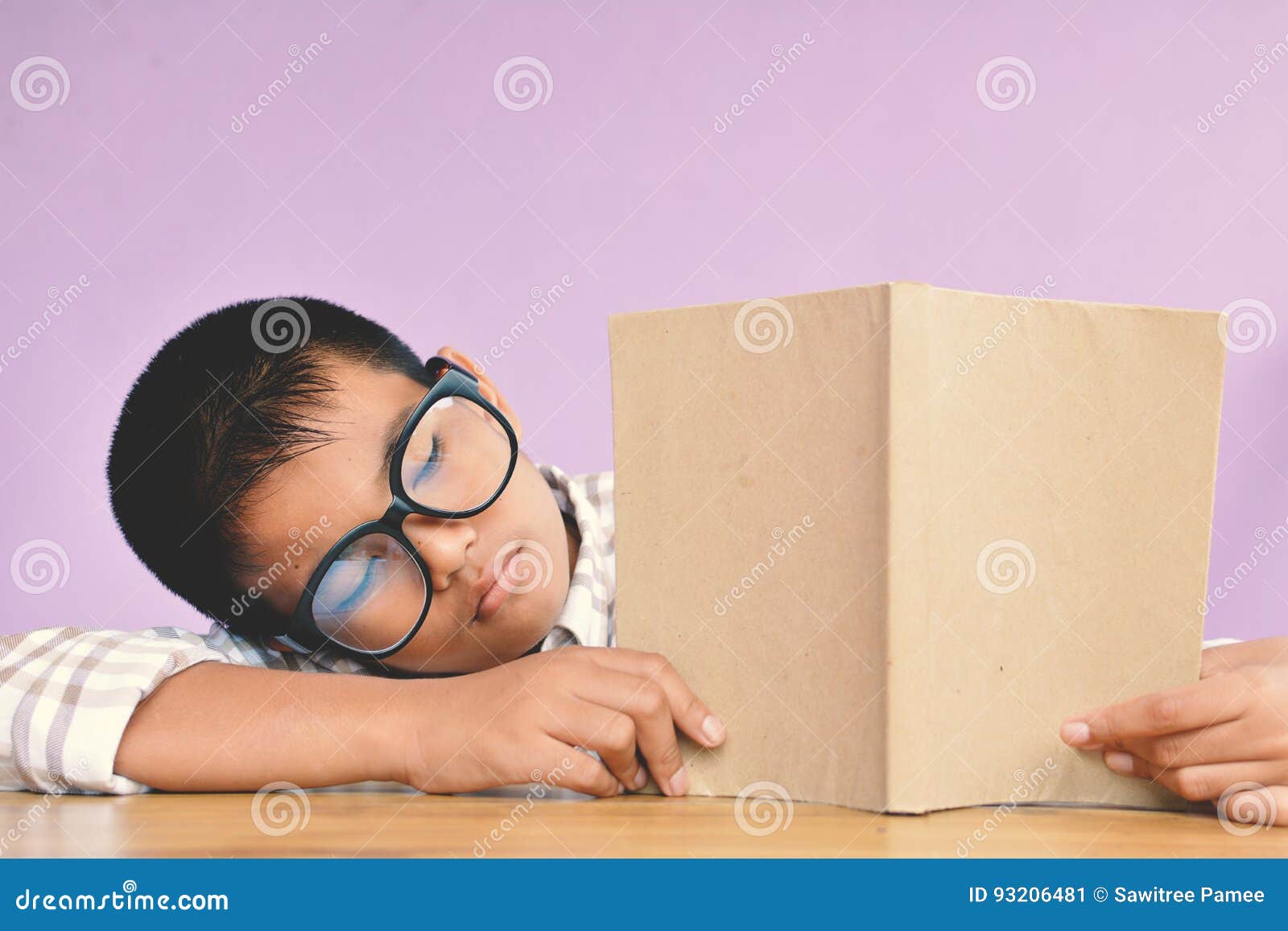 Asian boy reading a book stock image. Image of glasses - 93206481