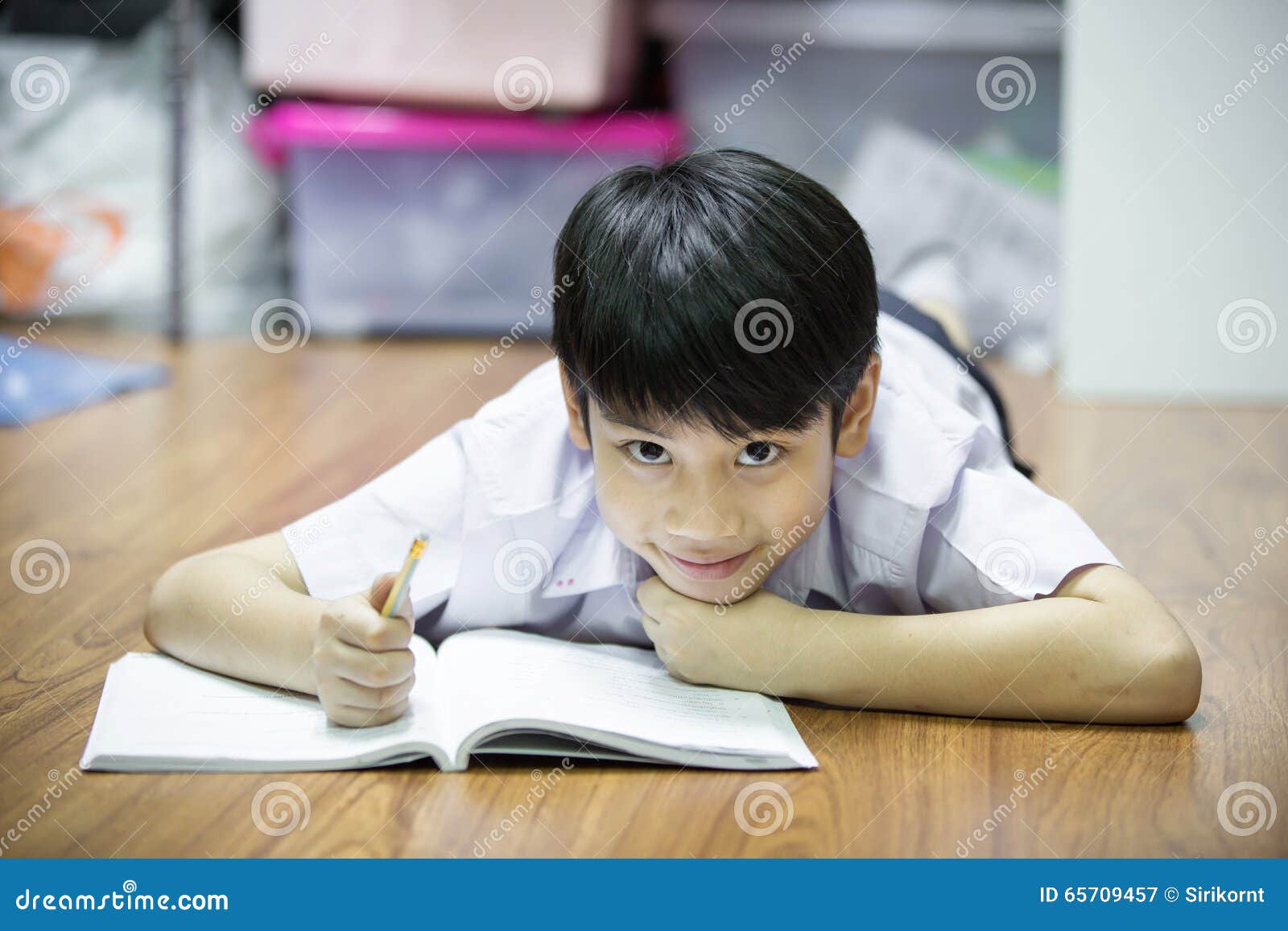 Asian Boy Rest on the Floor Doing Homework Stock Image - Image of asian ...