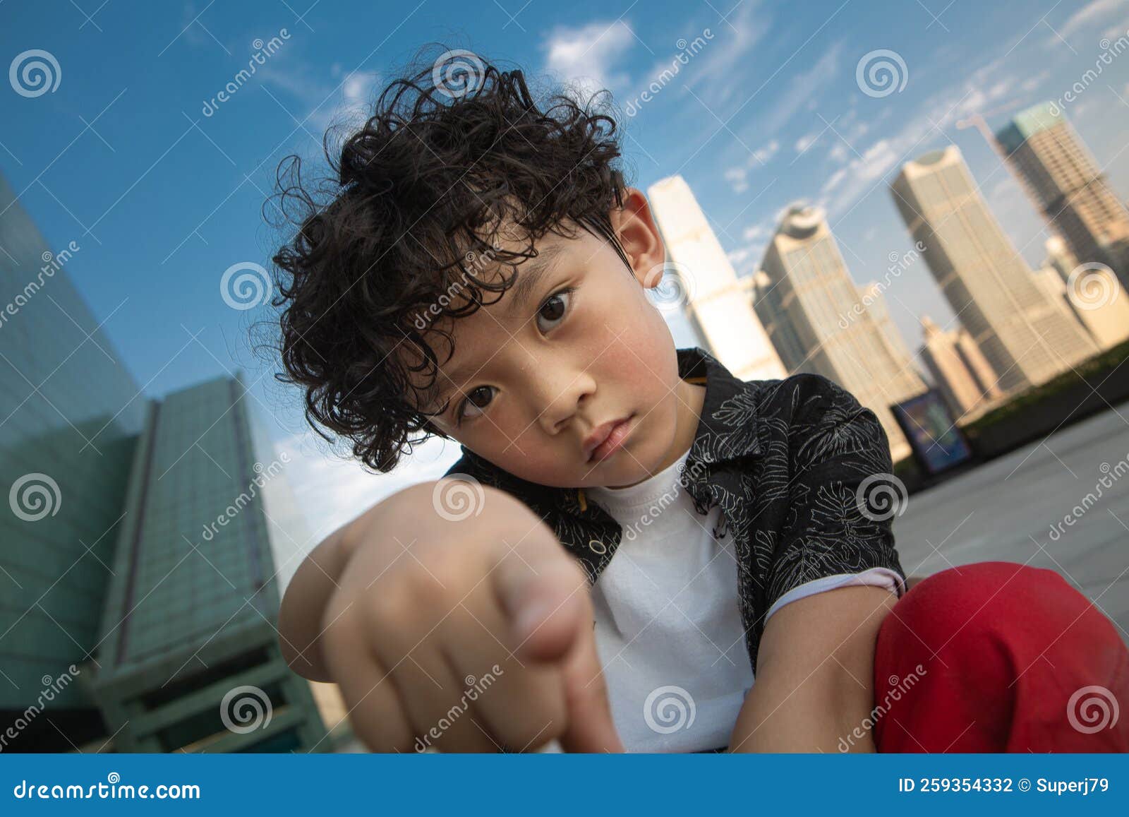 Boy pointing at the screen stock photo. Image of outdoor - 259354332