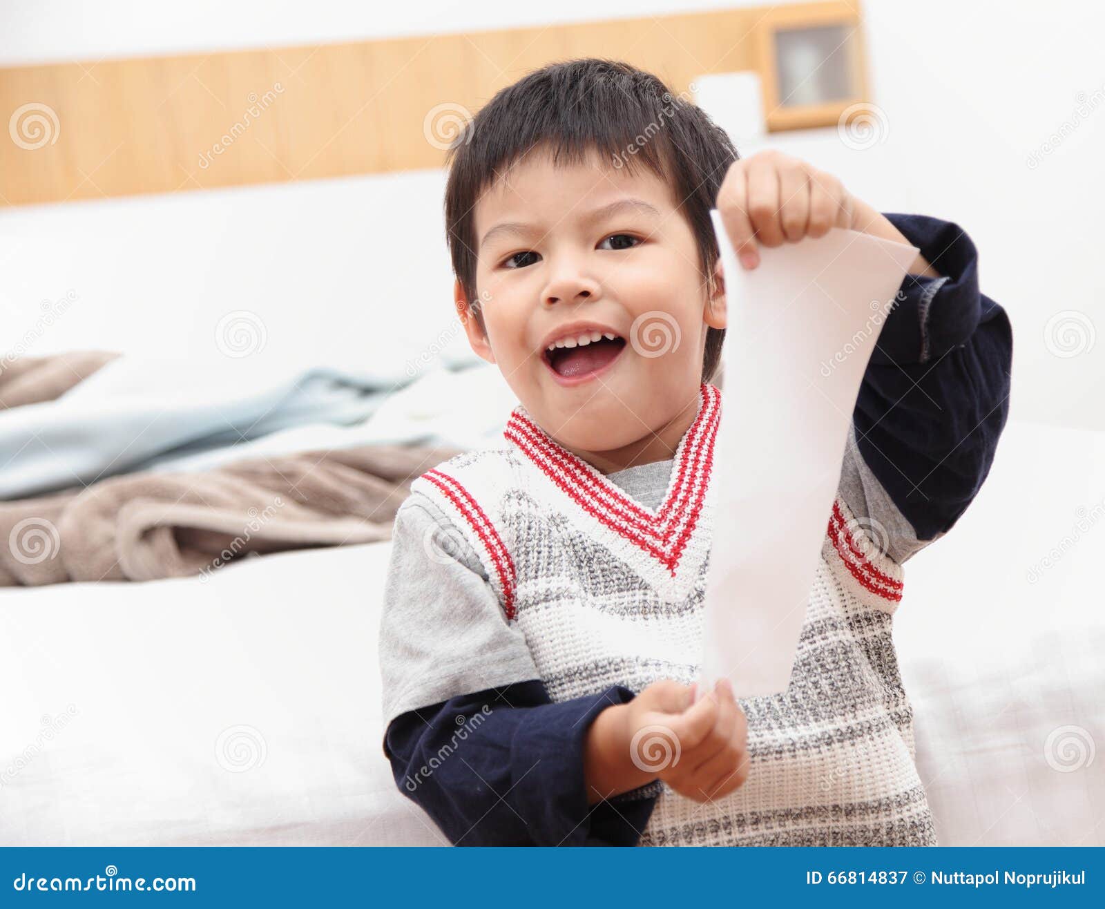 Asian Boy Show White Paper in the Bedroom. Stock Image - Image of ...