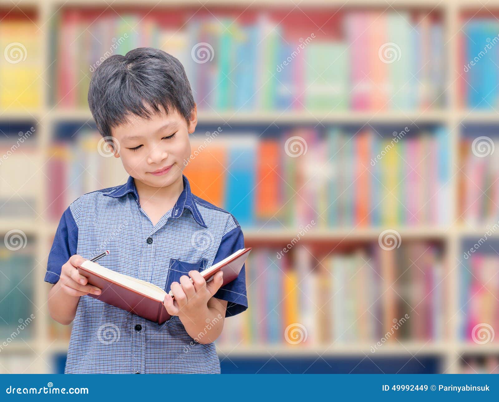 Asian Boy Student in School Library Stock Image - Image of book ...