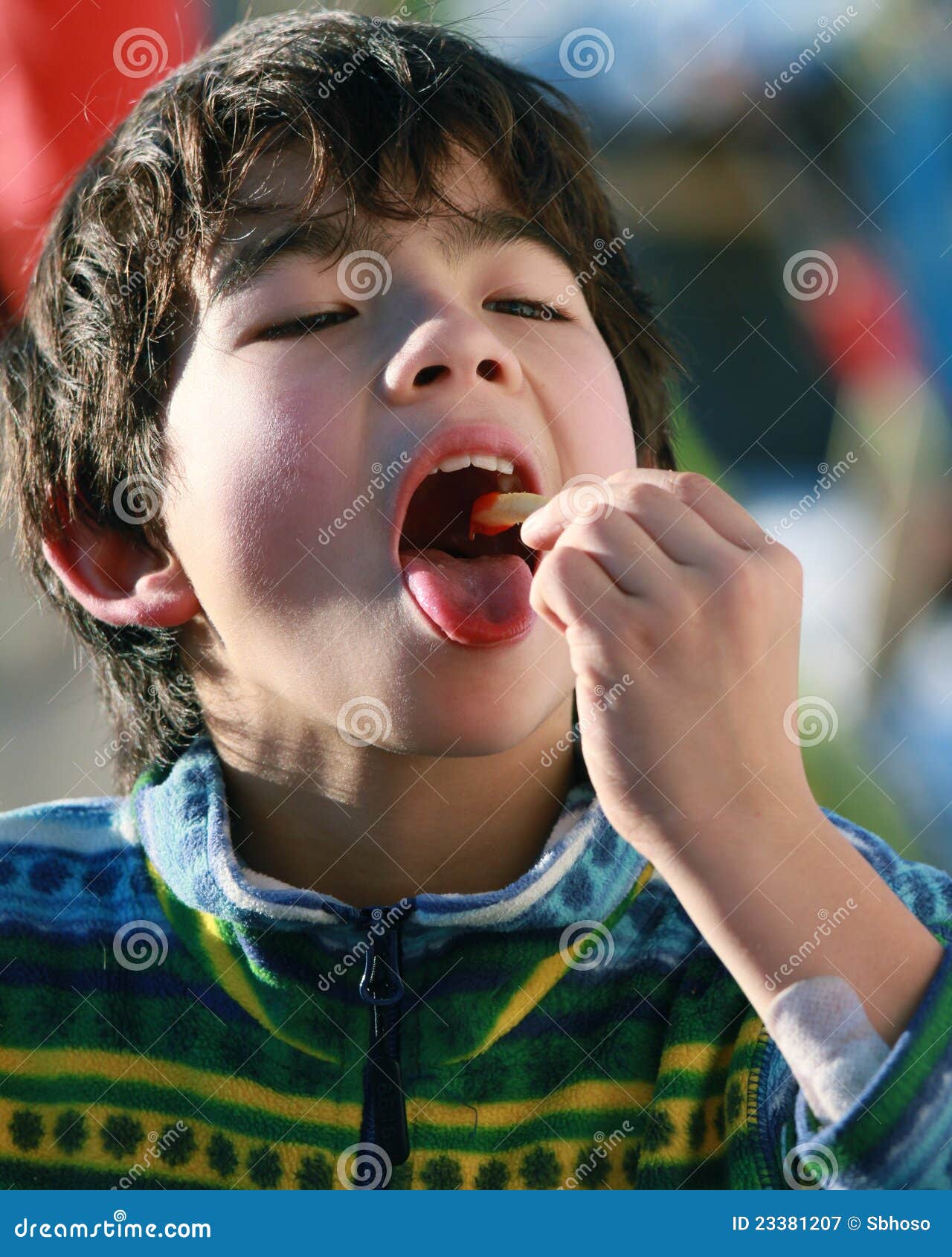 Asian Boy tasting a fry stock image. Image of beautiful - 23381207