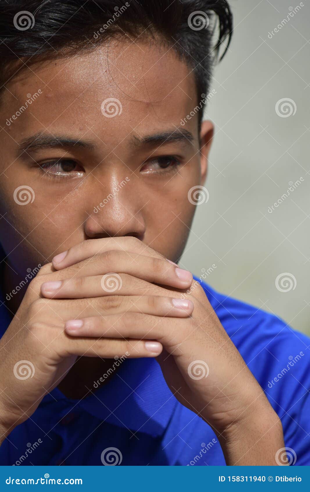 An an Asian Boy Thinking stock photo. Image of ponder - 158311940