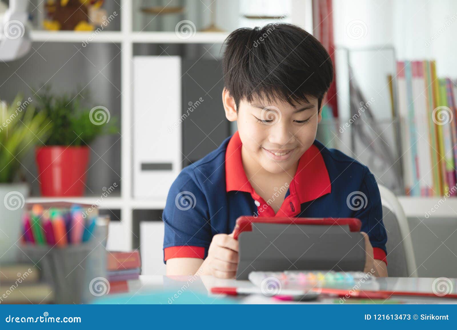 Asian Boy Watching on Tablet Computer ,smile Face . Stock Image - Image ...