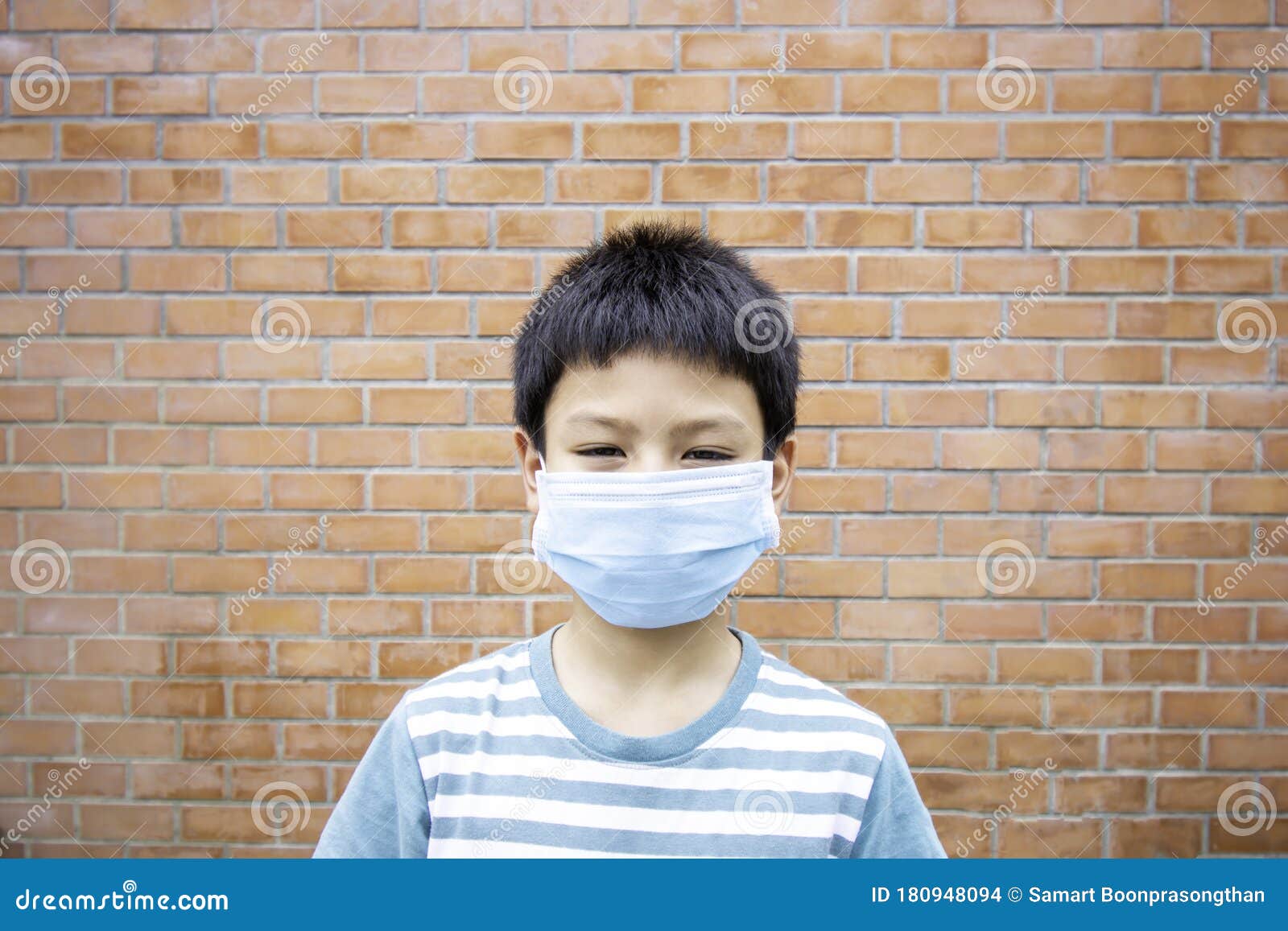 Asian Boy Wearing a Mask Background Brick Wall Stock Photo - Image of ...