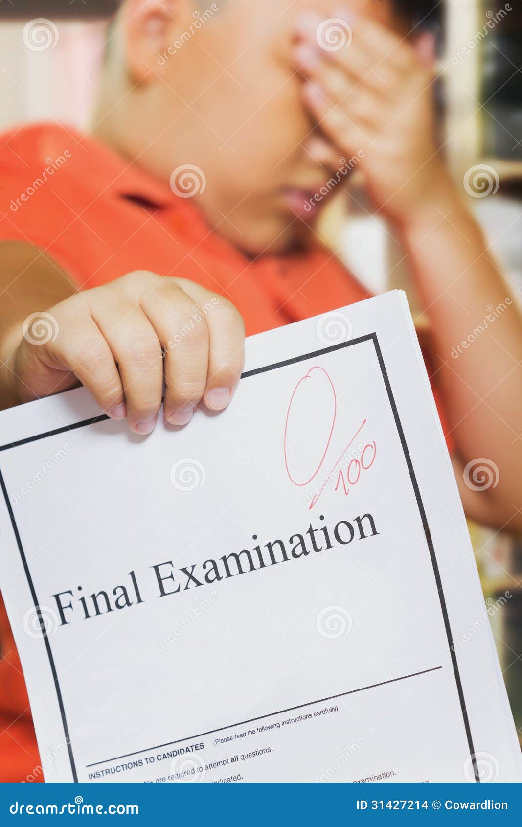 Asian Boy With Zero Score On Examination Paper Stock Photo ...