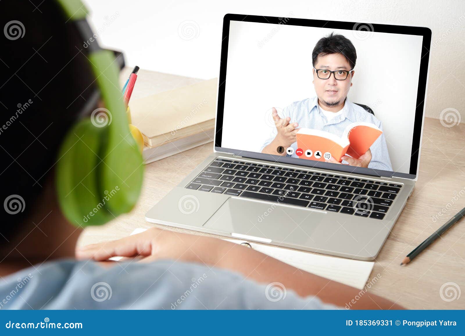 Asian Boys Learn Online from Home Via Video Calling Application on a ...