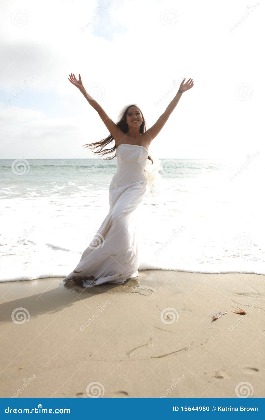 Asian Bride Celebrating Her Joy on the Beach Stock Photo - Image of ...