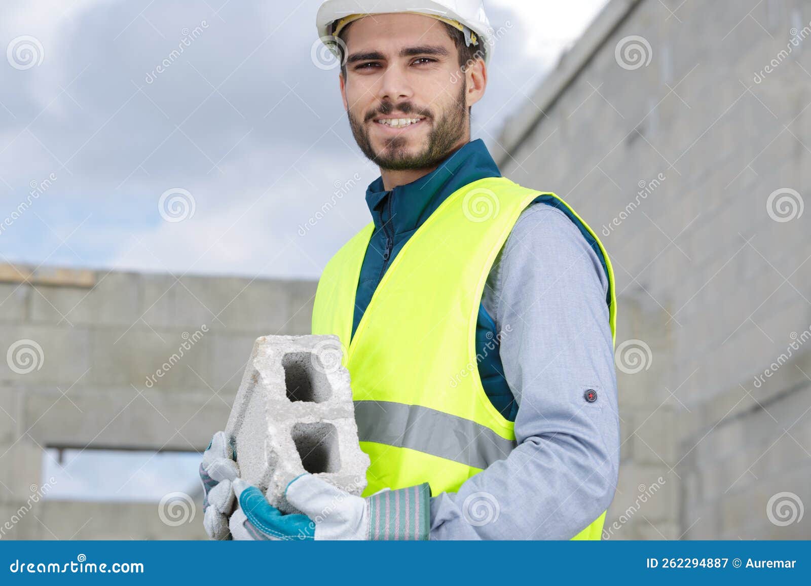 Asian Builder Man Holding Concrete Blocks for House Building Stock ...