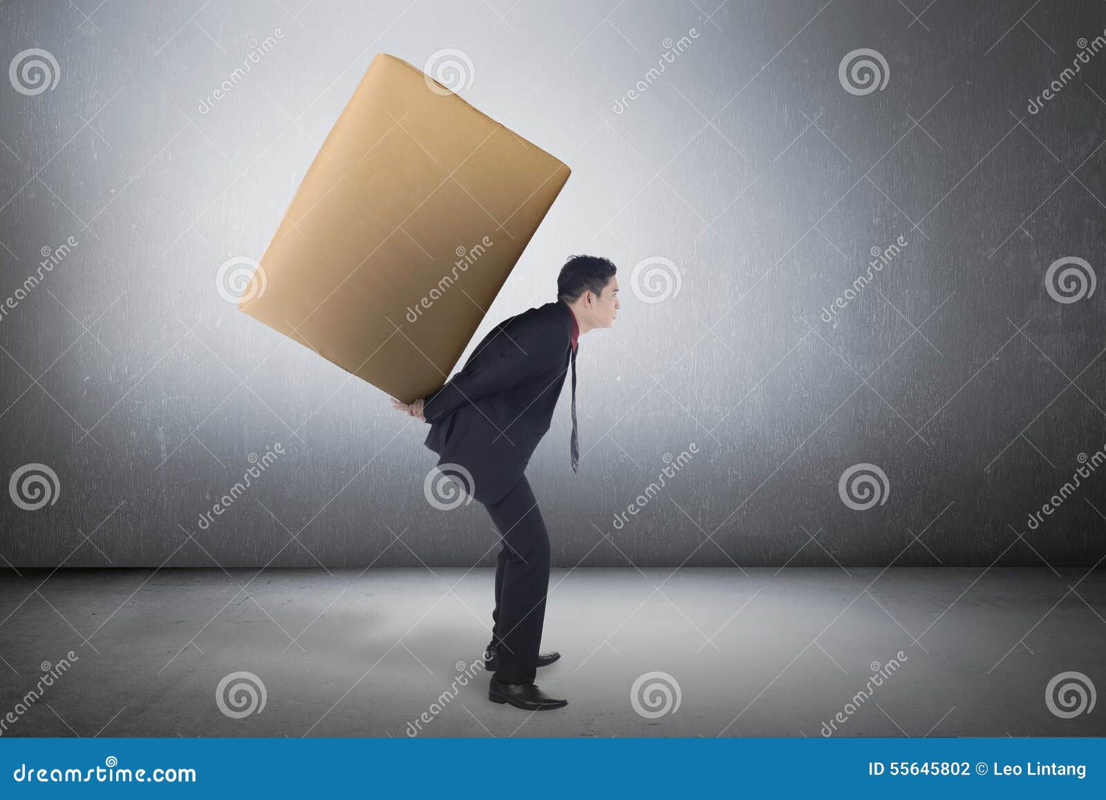 Asian Business Man Carrying Brown Package on His Back Stock Photo ...