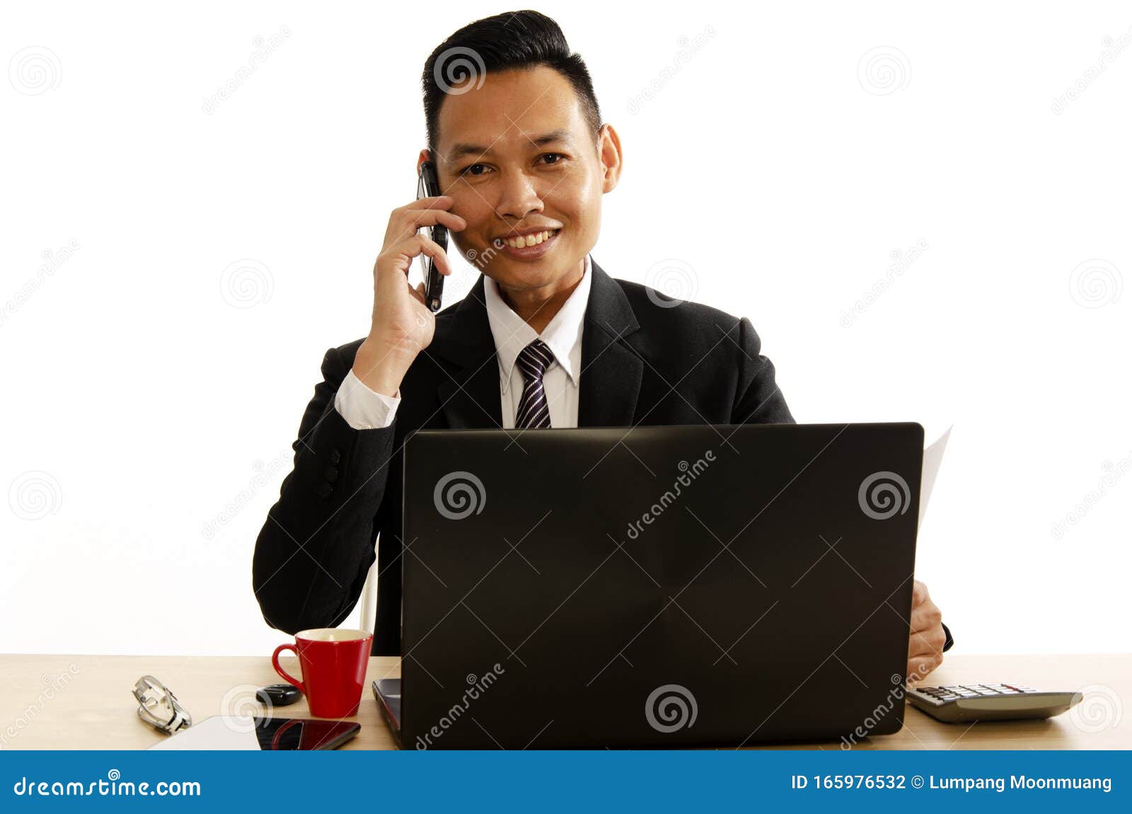 Asian Business Man Smile and Using Smartphone and Labtop Computer on ...