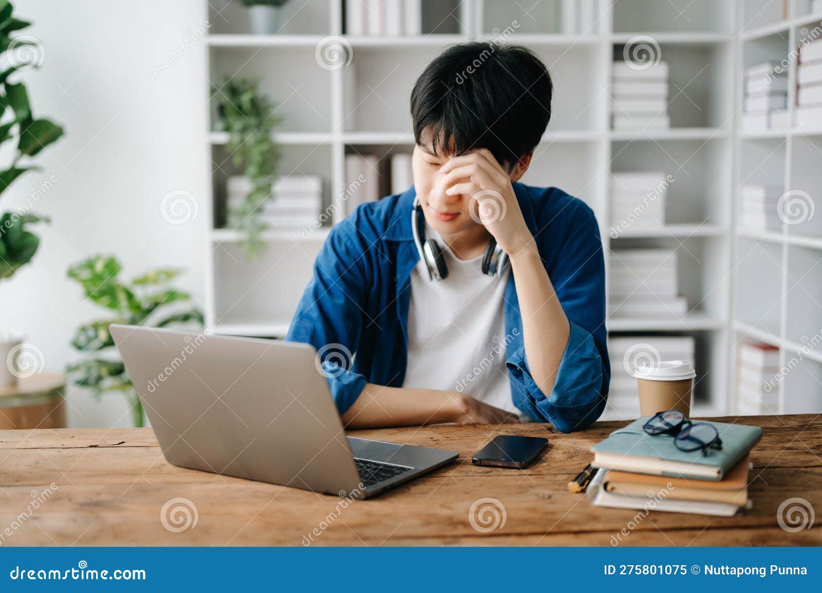 Asian Business Man is Stressed, Bored, and Overthinking from Working on ...