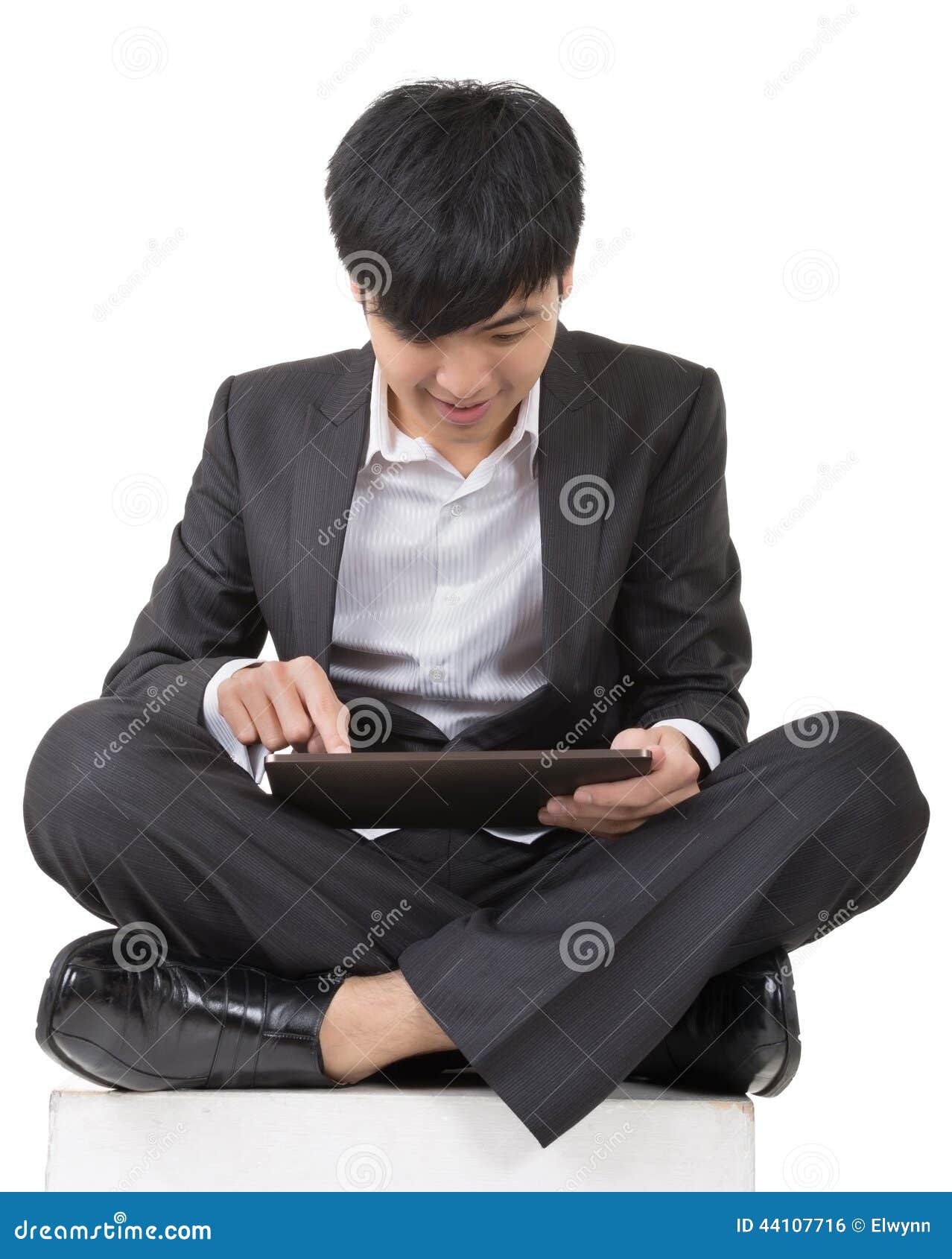 Asian Business Man Using Pad and Sit on Ground Stock Photo - Image of ...