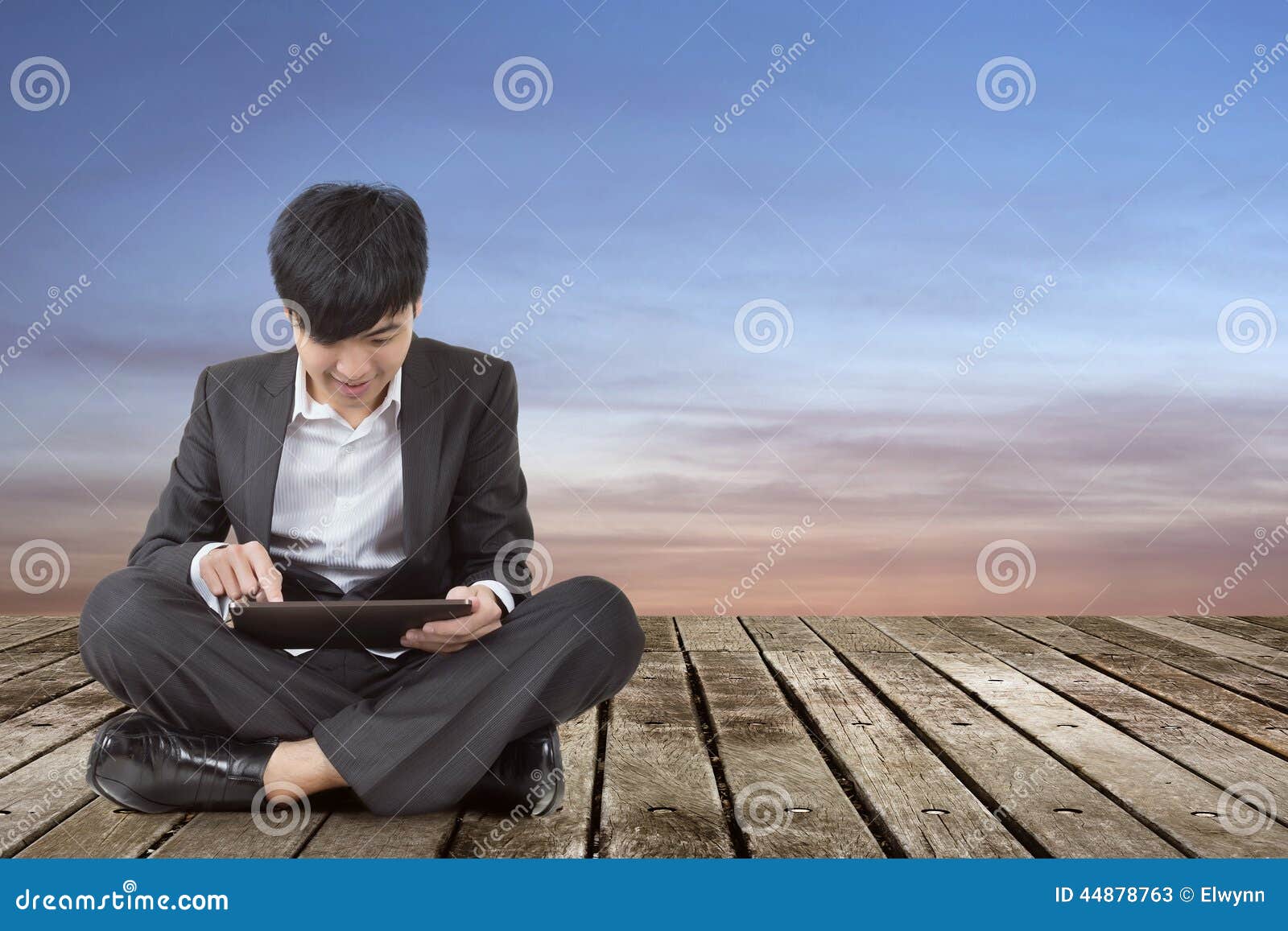 Asian Business Man Using Pad and Sit on Ground Stock Image - Image of ...