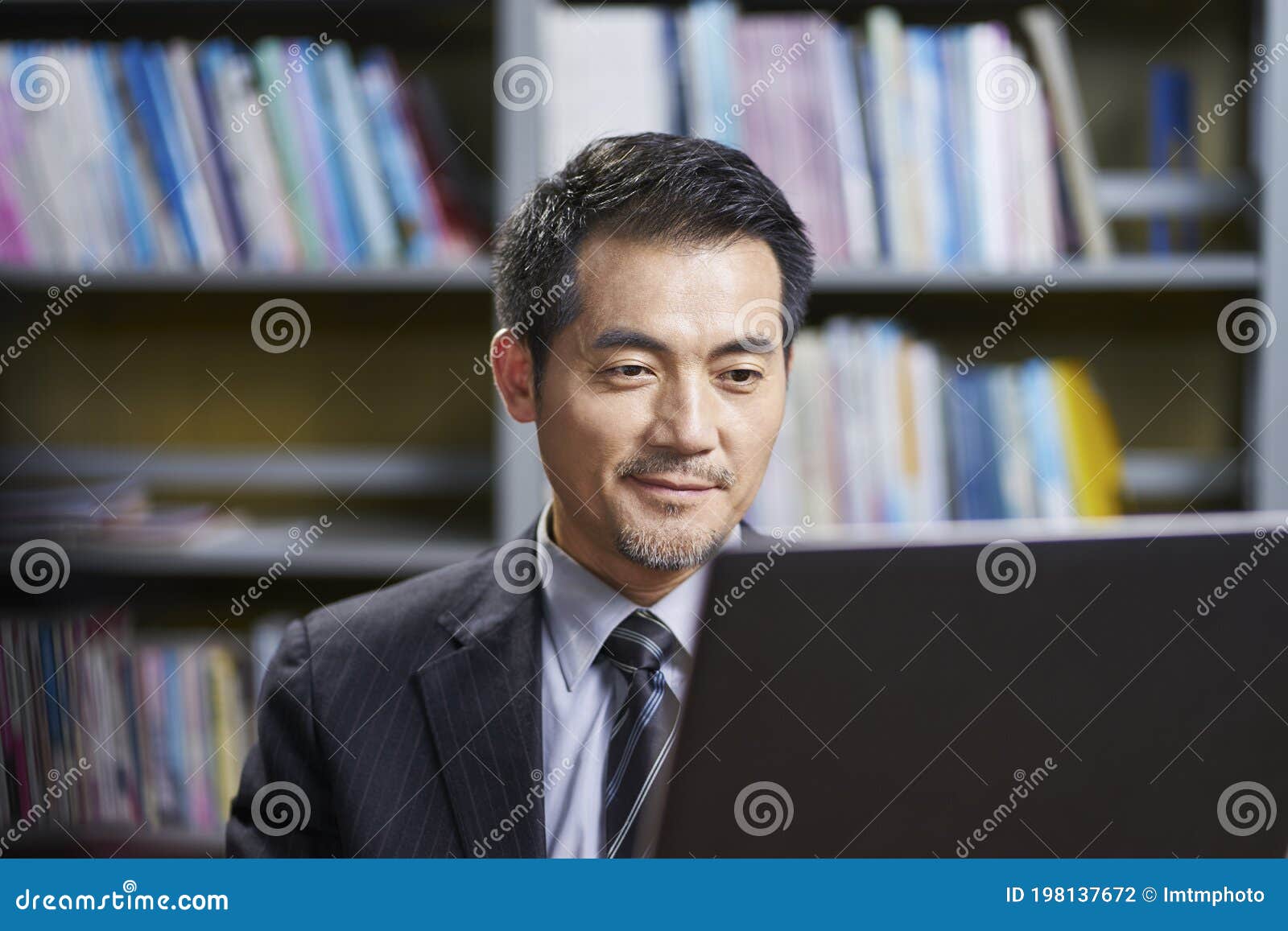 Asian Business Man Working in Office Using Laptop Stock Photo - Image ...