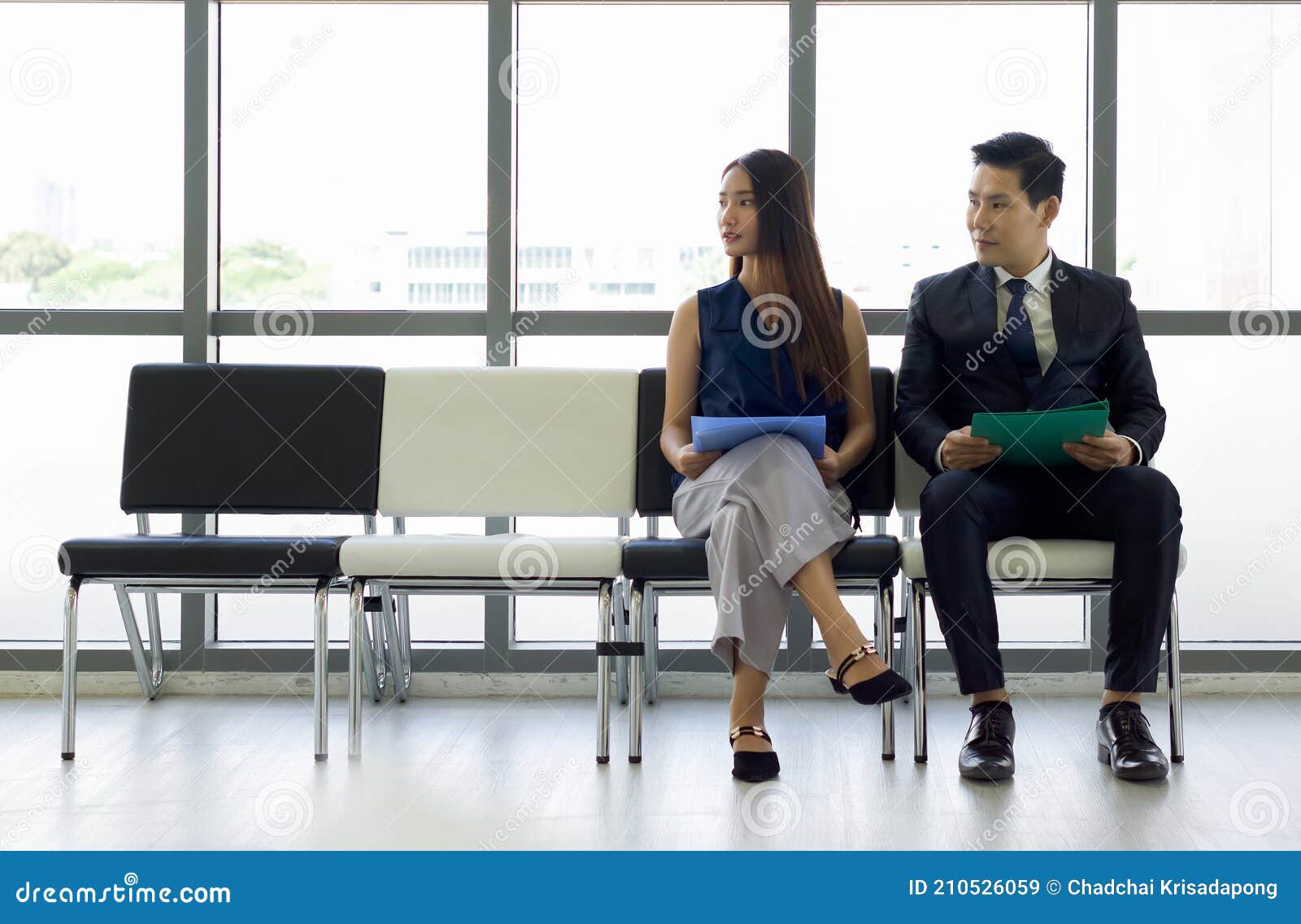 Asian Business People Waiting for Job Interview. Both of Them Looking ...
