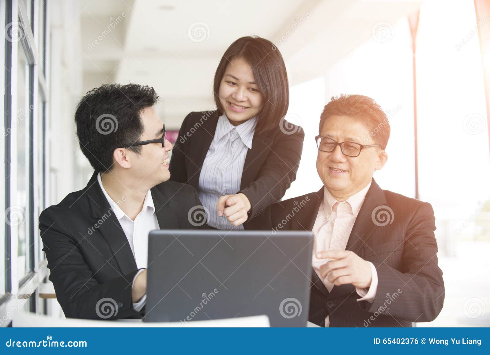 Asian business team stock photo. Image of discussion - 65402376