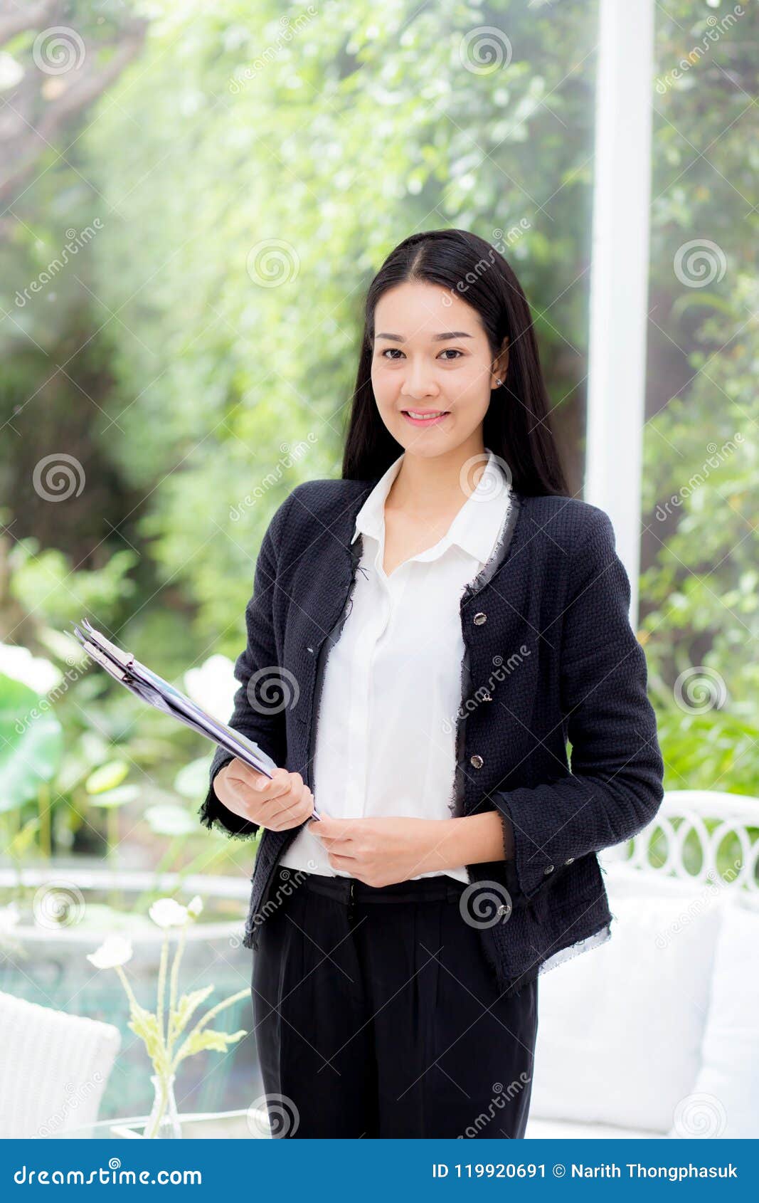 Asian Business Woman Holding Clipboard Folder in the Office. Stock ... Asian Business Woman Holding Clipboard Folder in the Office. Stock ...