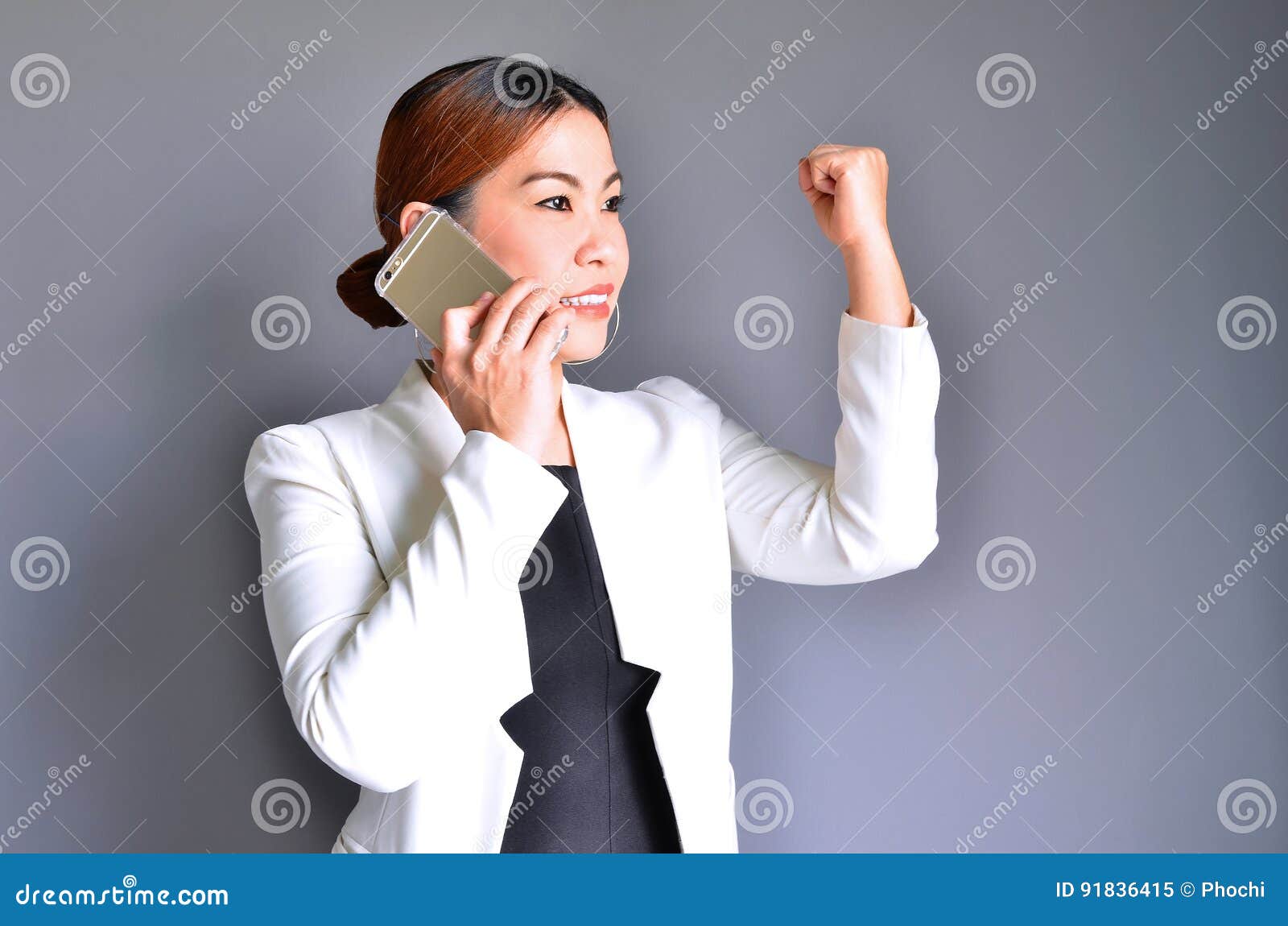 Asian Business Woman Holding a Mobile Phone Successfully Stock Image ... Asian Business Woman Holding a Mobile Phone Successfully Stock Image ...